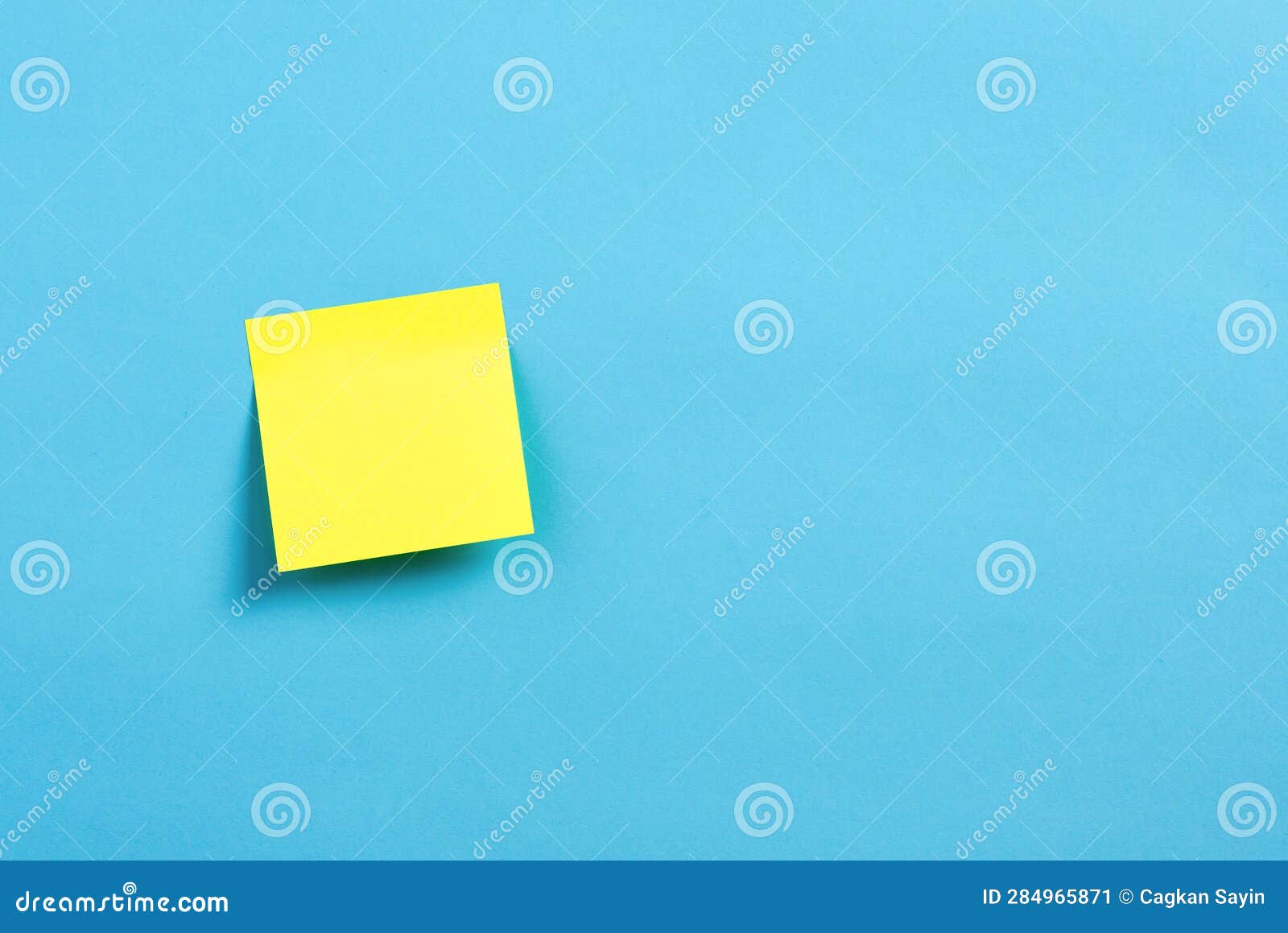 Blank or Empty Yellow Sticky Note Paper on Blue Background Stock Image ...