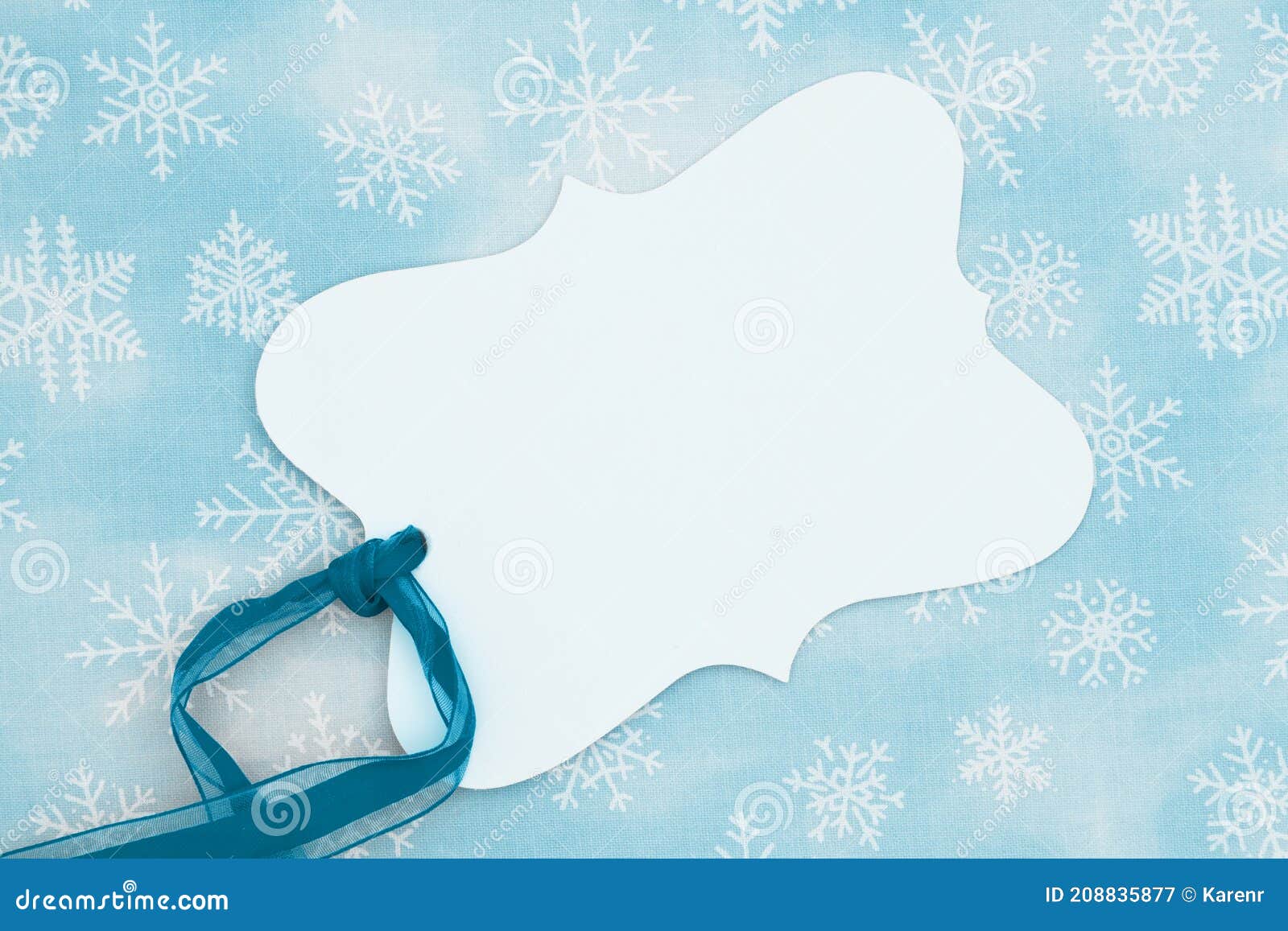 Blank Gift Tag with a Blue Ribbon on Snowflakes Stock Image - Image of ...