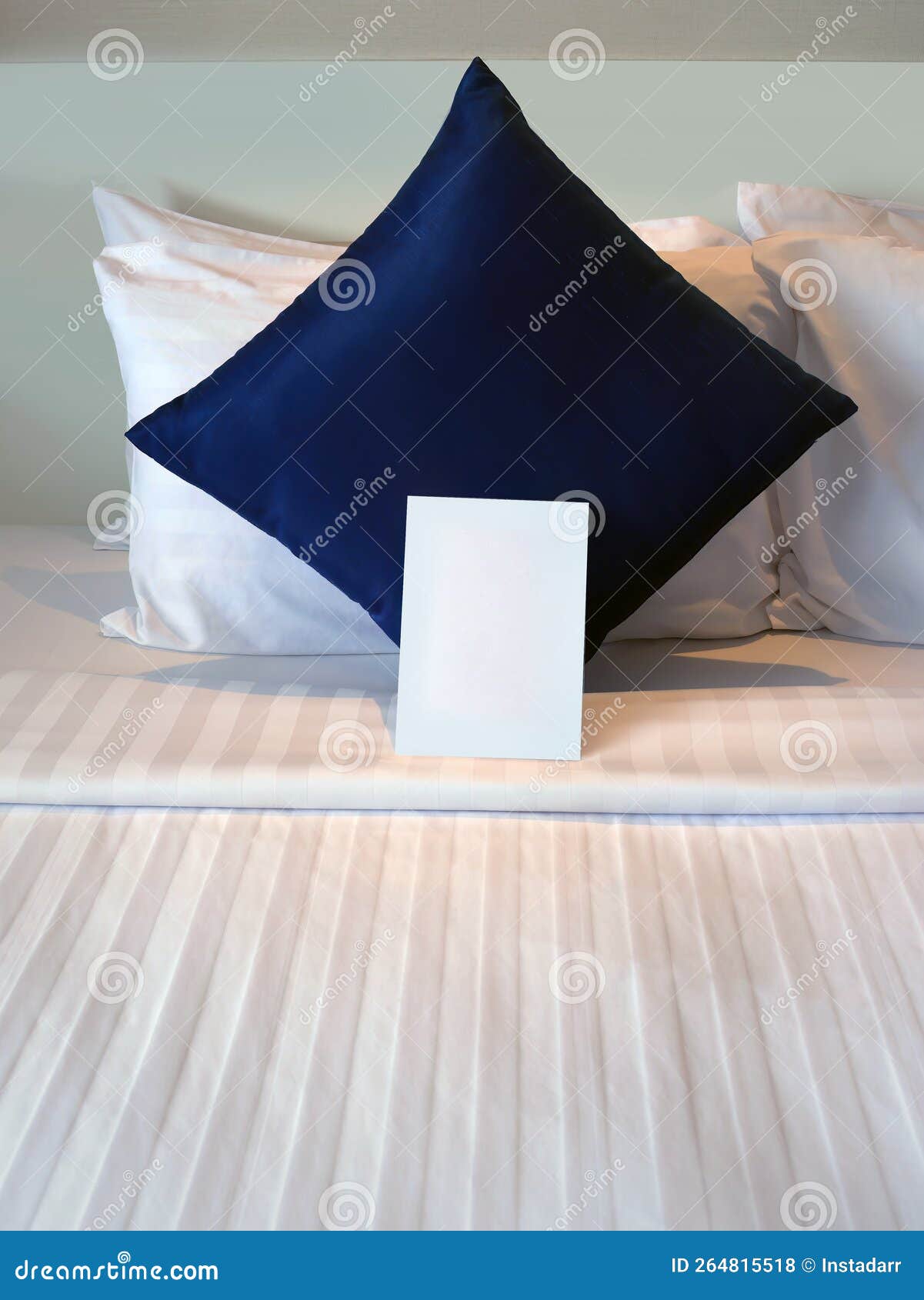 Blank Greetings Card at the Dark Blue Pillow on the Bed with Hotel Turn ...