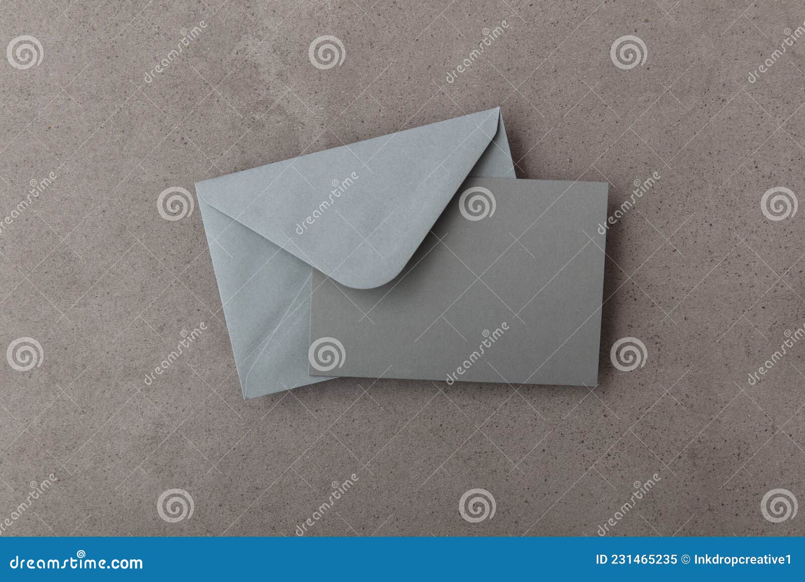 Blank Grey Card with Grey Paper Envelope Template Mock Up on a Concrete ...