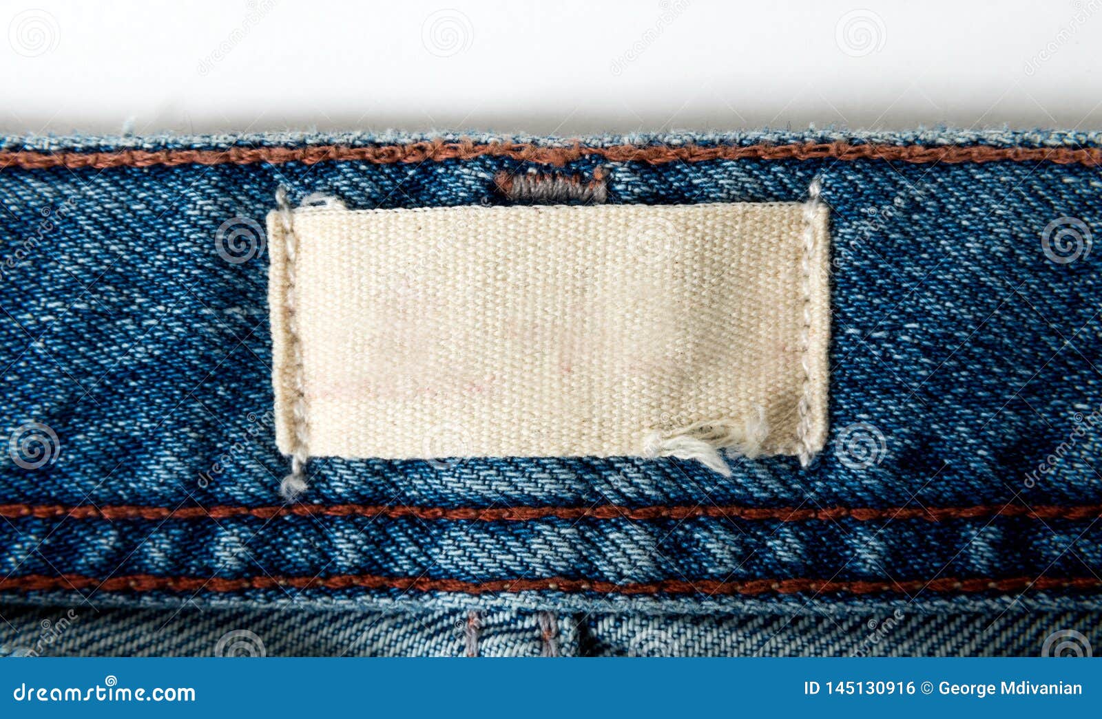 Blank label on jeans stock photo. Image of fashion, fabric - 145130916