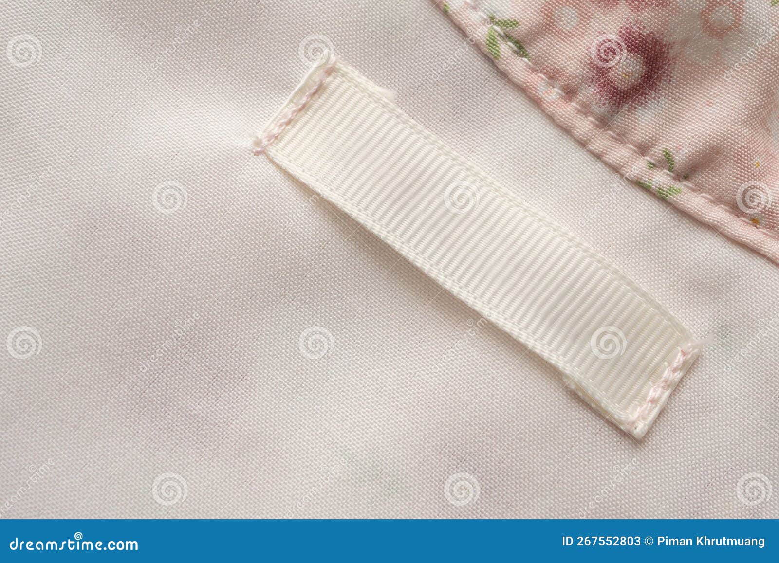 Blank Laundry Care Clothes Label on Fabric Texture Background Stock ...