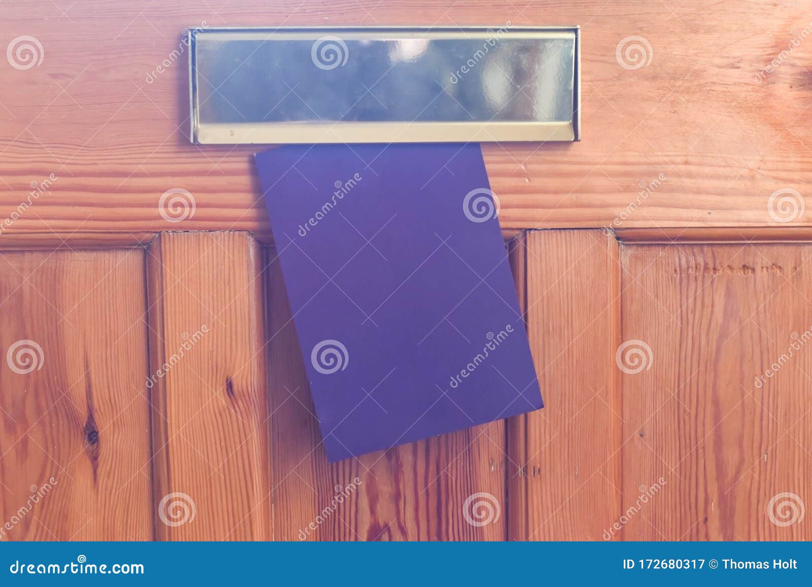 Blank Leaflet or Flyer Being Posted through a Letter Box Unwanted Junk ...