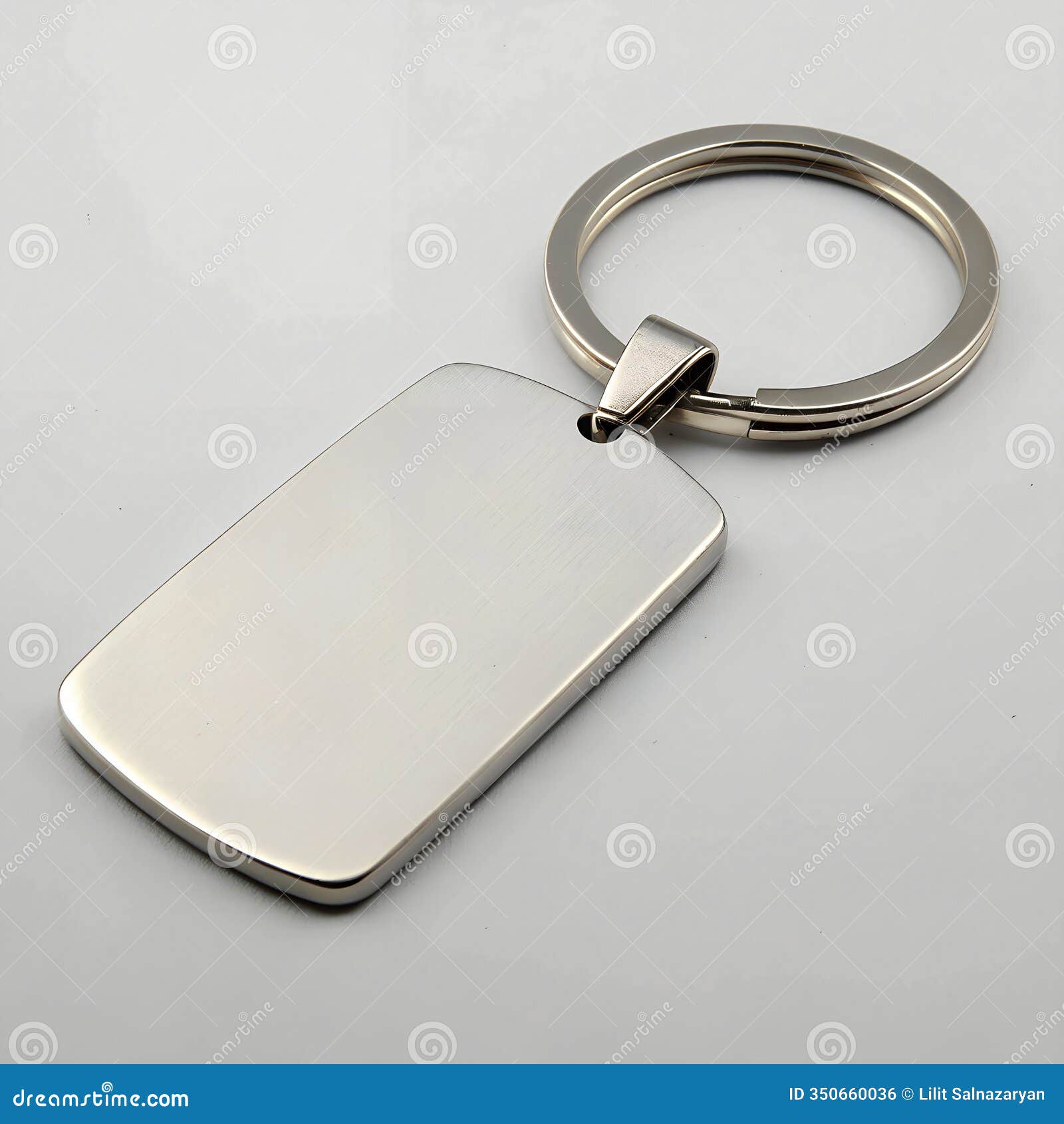 A Blank, Rectangular Silver Metal Keychain on a White Background. Clean ...
