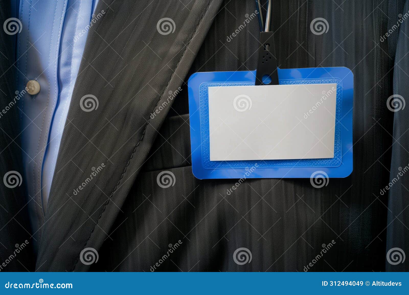 Blank Nametag With A Blue Border On A Dark Suit Jacket Royalty-Free ...