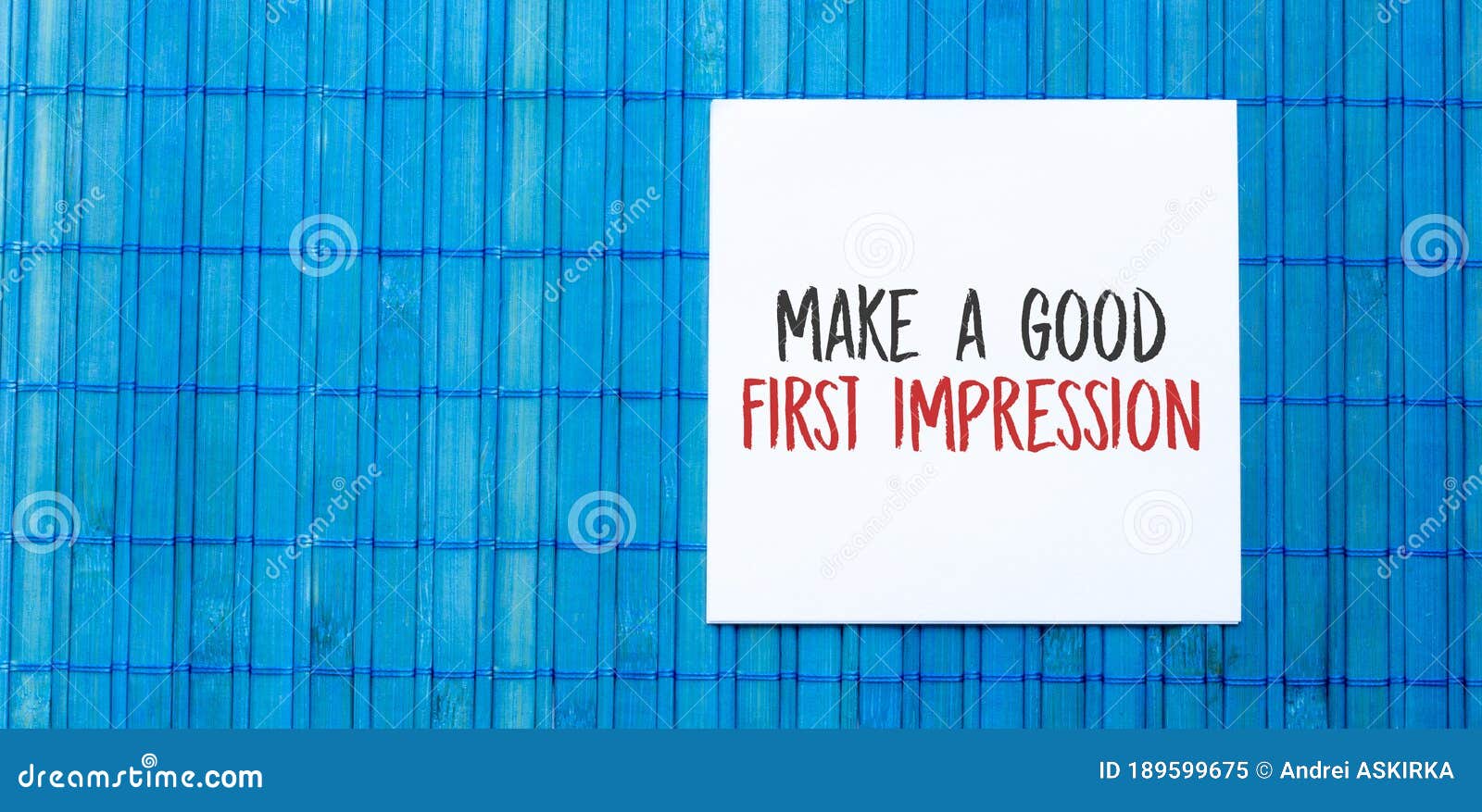Blank Note Pad with MAKE a GOOD FIRST IMPRESSION Text on Blue Wooden ...
