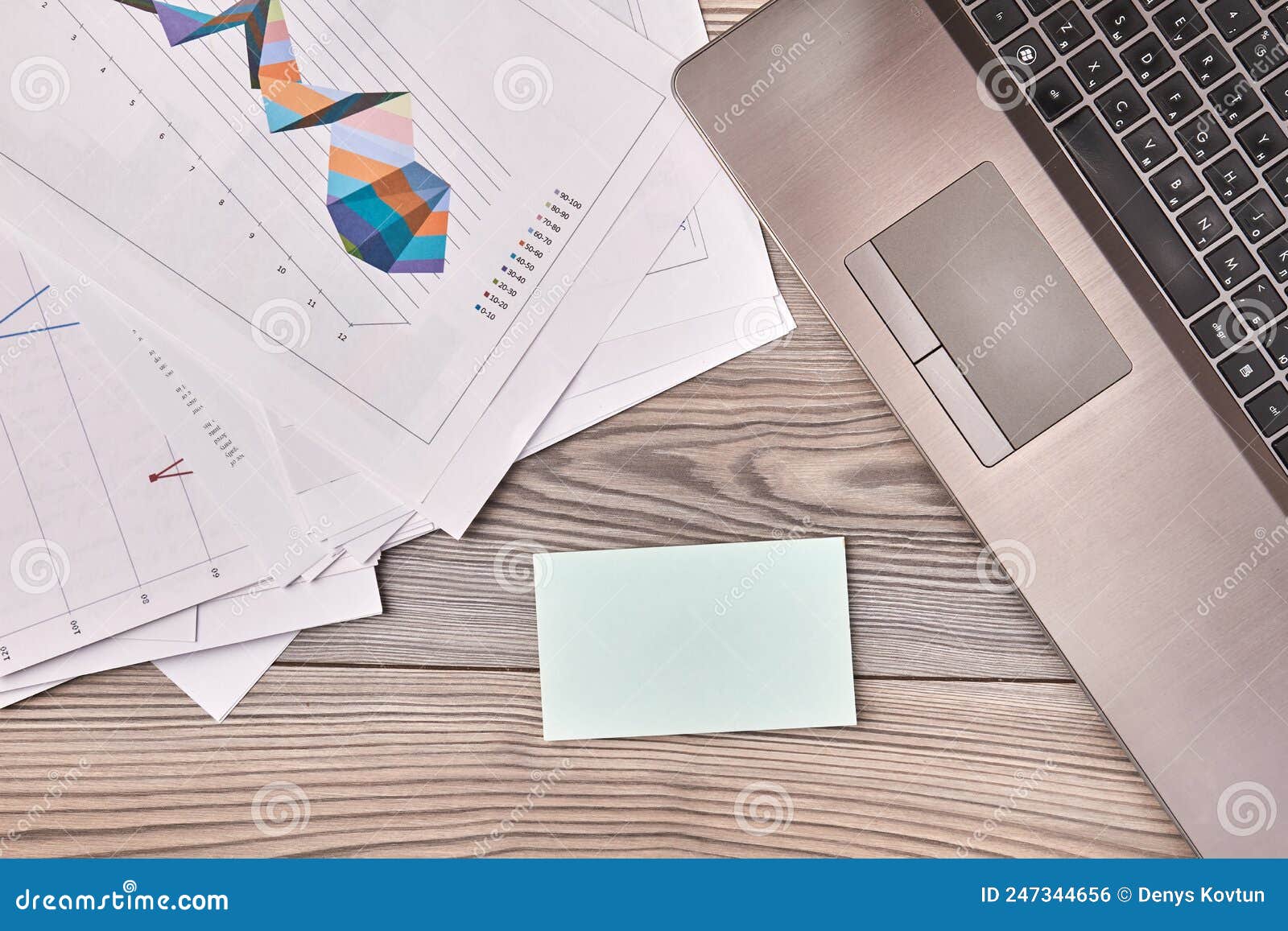 Blank Note Paper for Copy Space with Charts and Laptop. Stock Photo ...