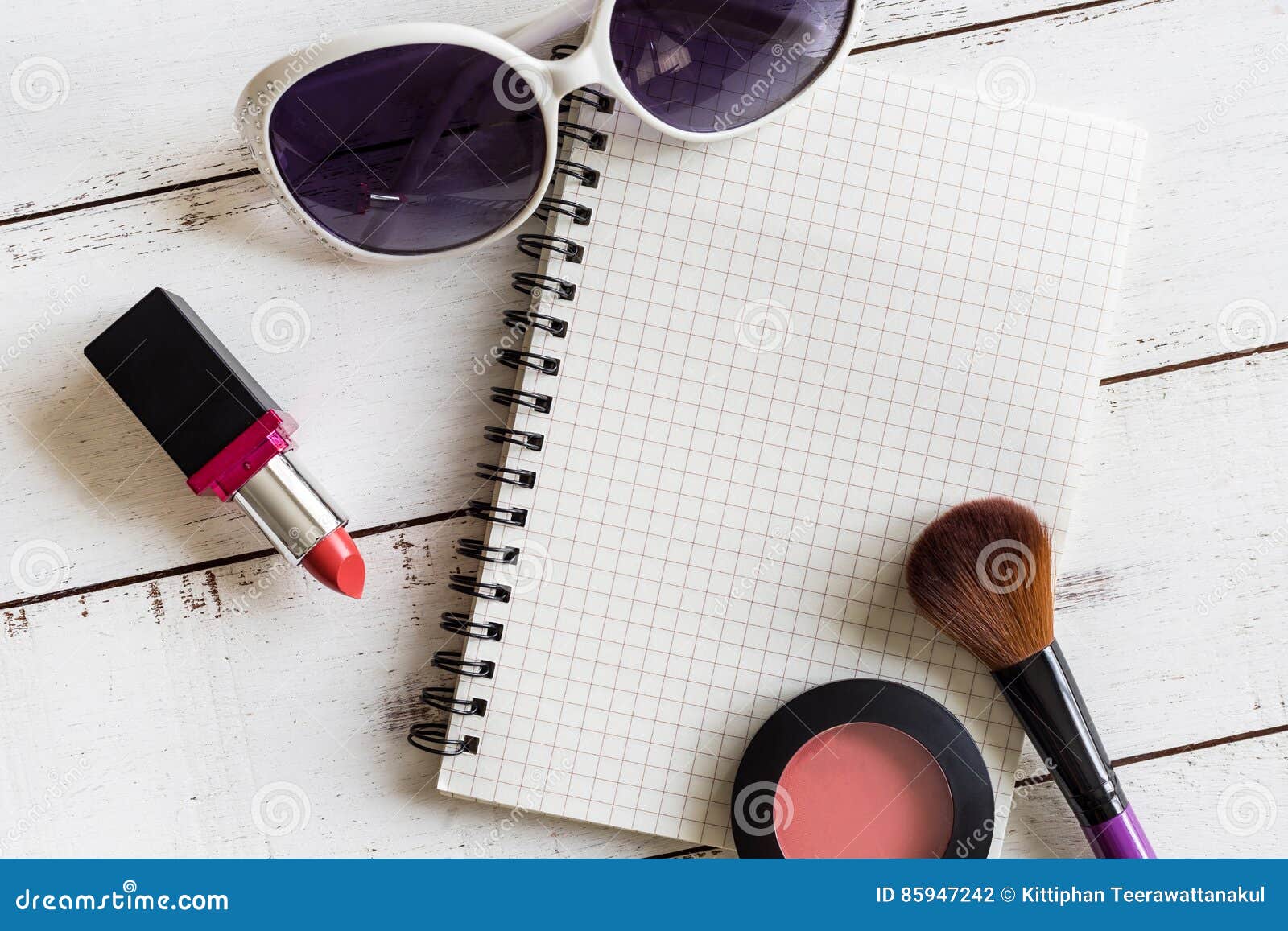 Blank Notebook with Makeup Products and Cosmetics on Wooden Table Stock ...