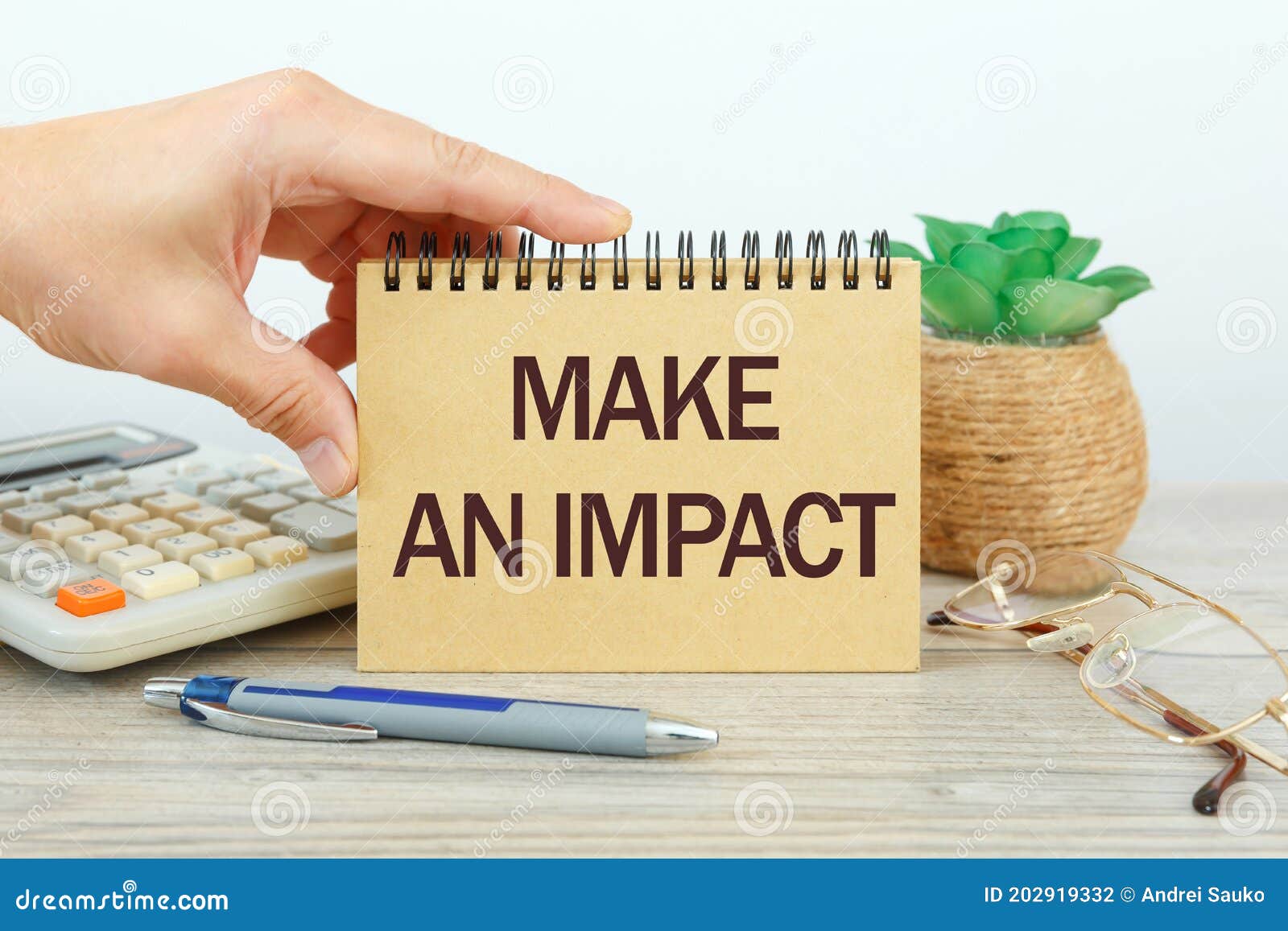 Blank Notepad with Text MAKE an IMPACT with Office Supplies Stock Photo ...