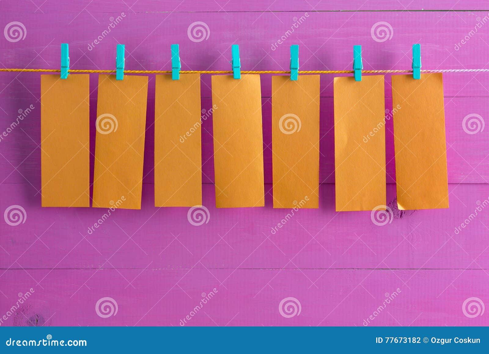 Blank Orange Note Pad Sheets Hanging from String Stock Photo - Image of ...