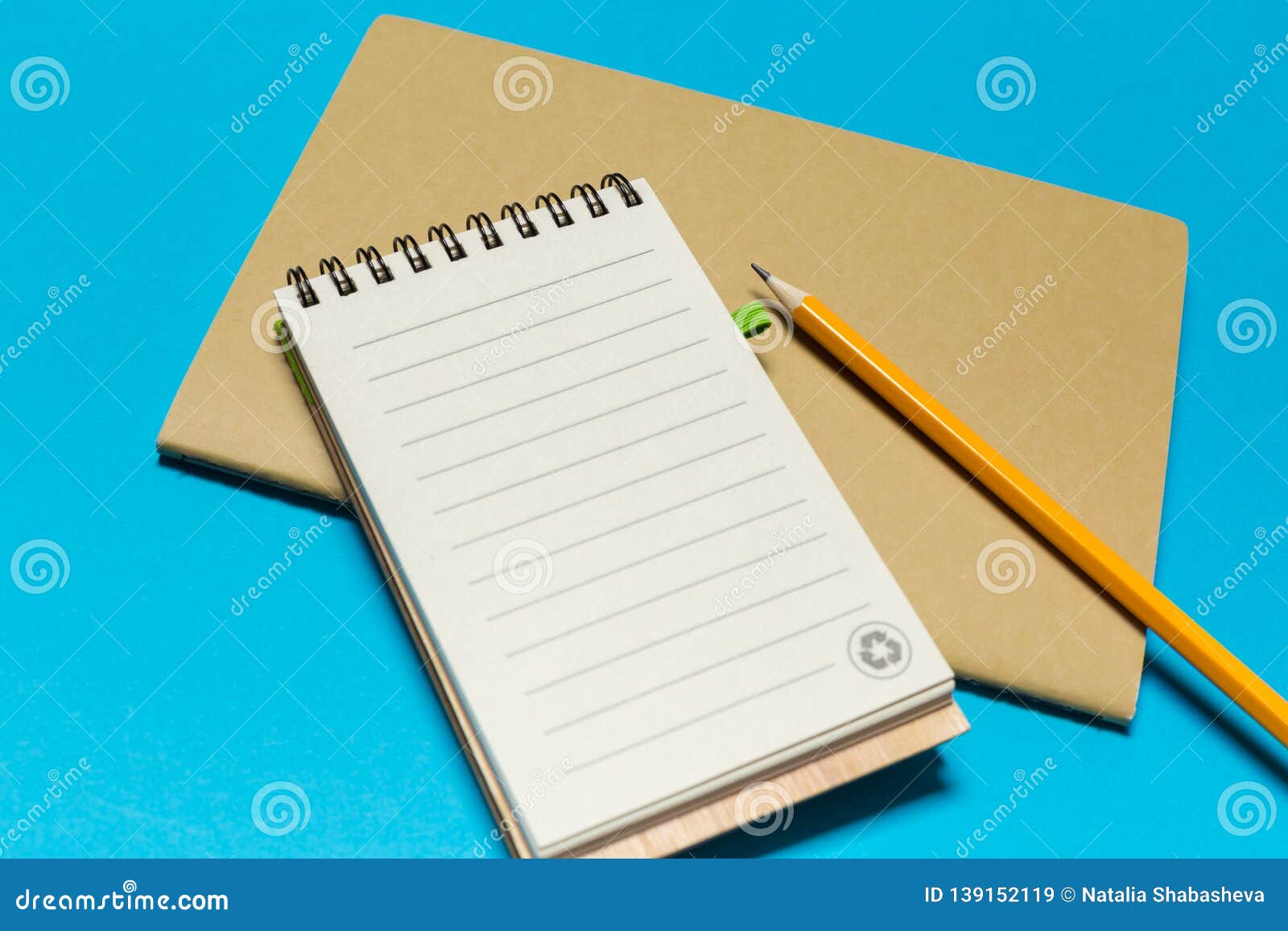 Blank Paper Notebook on Blue Background Stock Image - Image of spiral ...
