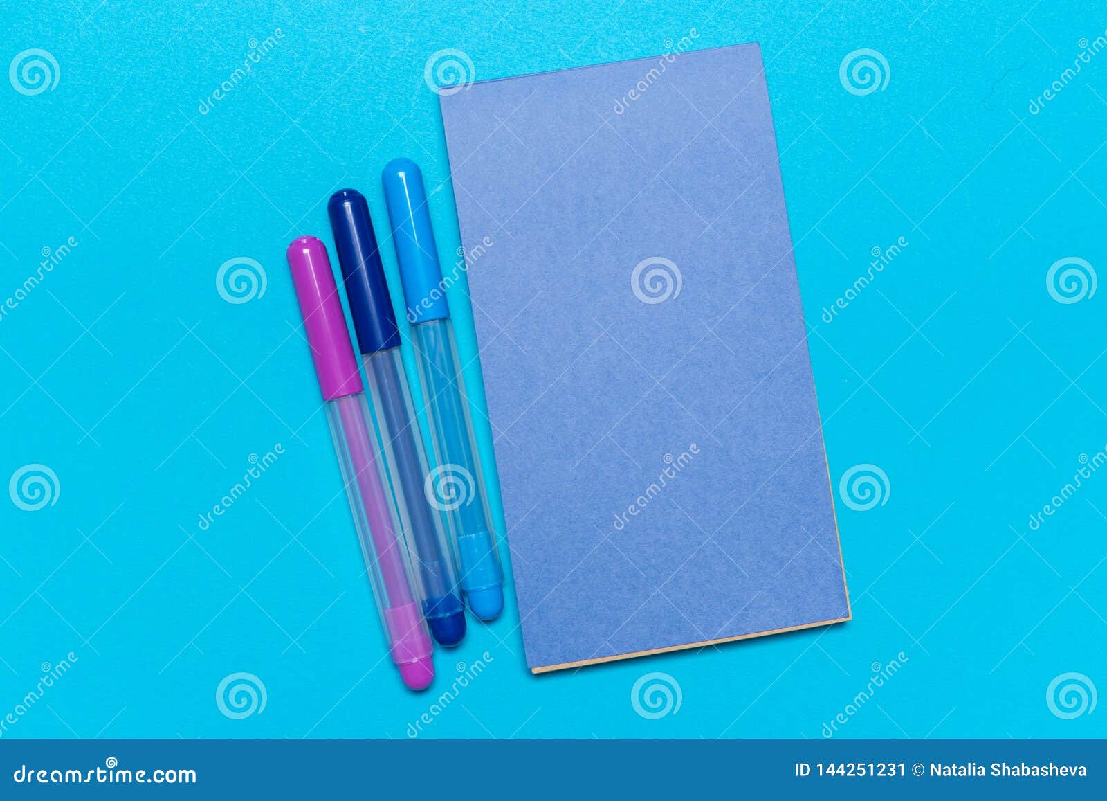 Blank Paper Notebook on Blue Background Stock Image - Image of note ...