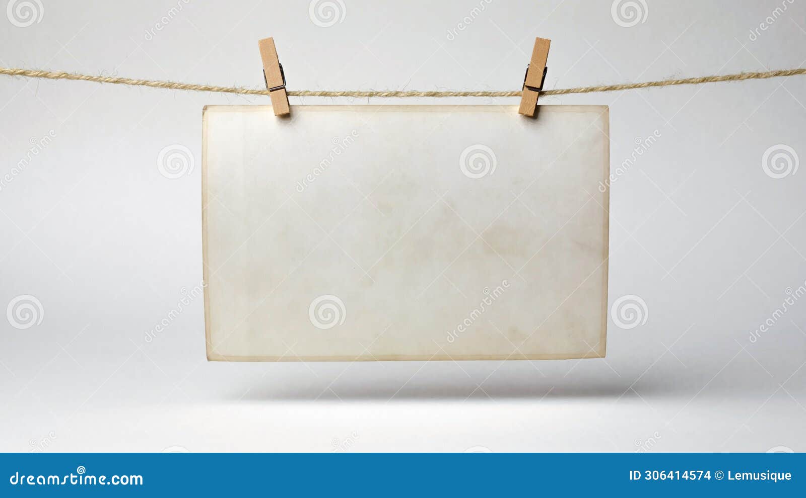 Blank Photo or Paper Note Hanging from a String with Clothespins on a ...