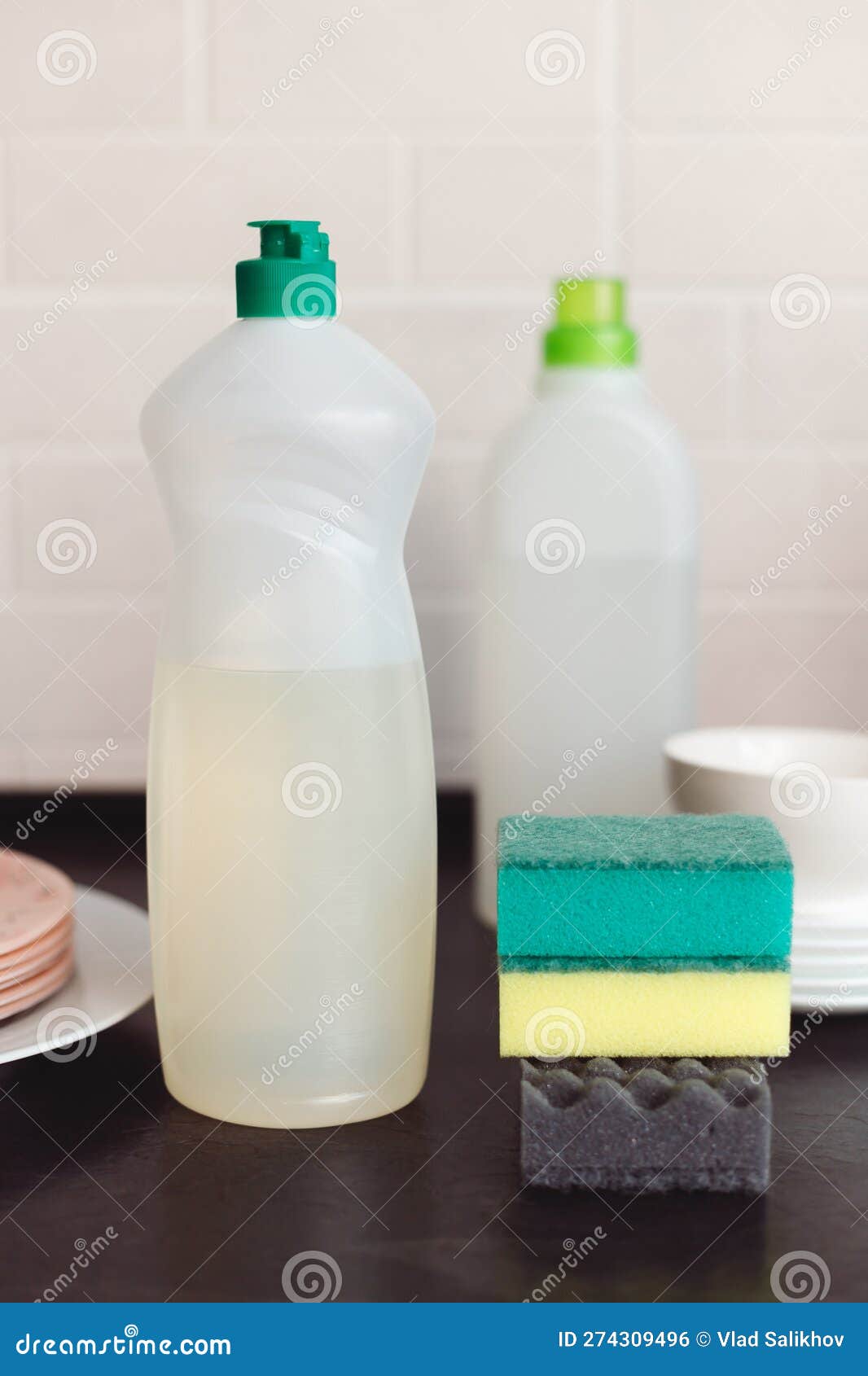 Blank Plastic Bottle with Liquid Dishwashing Detergent on Kitchen Table ...