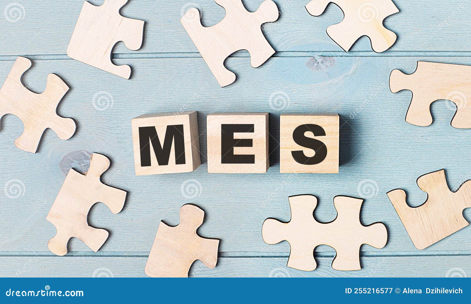 Blank Puzzles and Wooden Cubes with the Text MES Manufacturing ...
