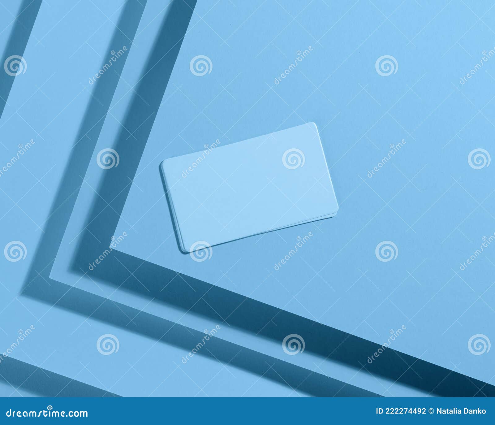 Blank Rectangular Business Card on Creative Blue Background from Sheets ...