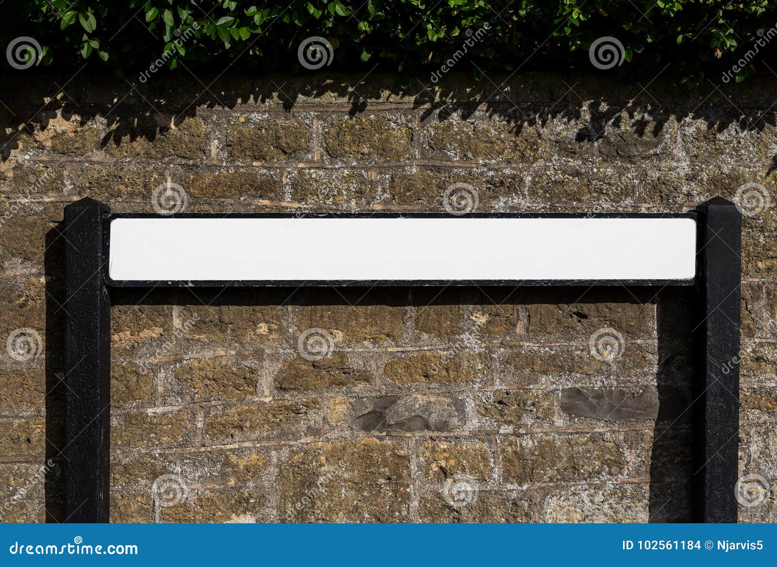Blank Road Name Sign on Brick Background Stock Photo - Image of ...