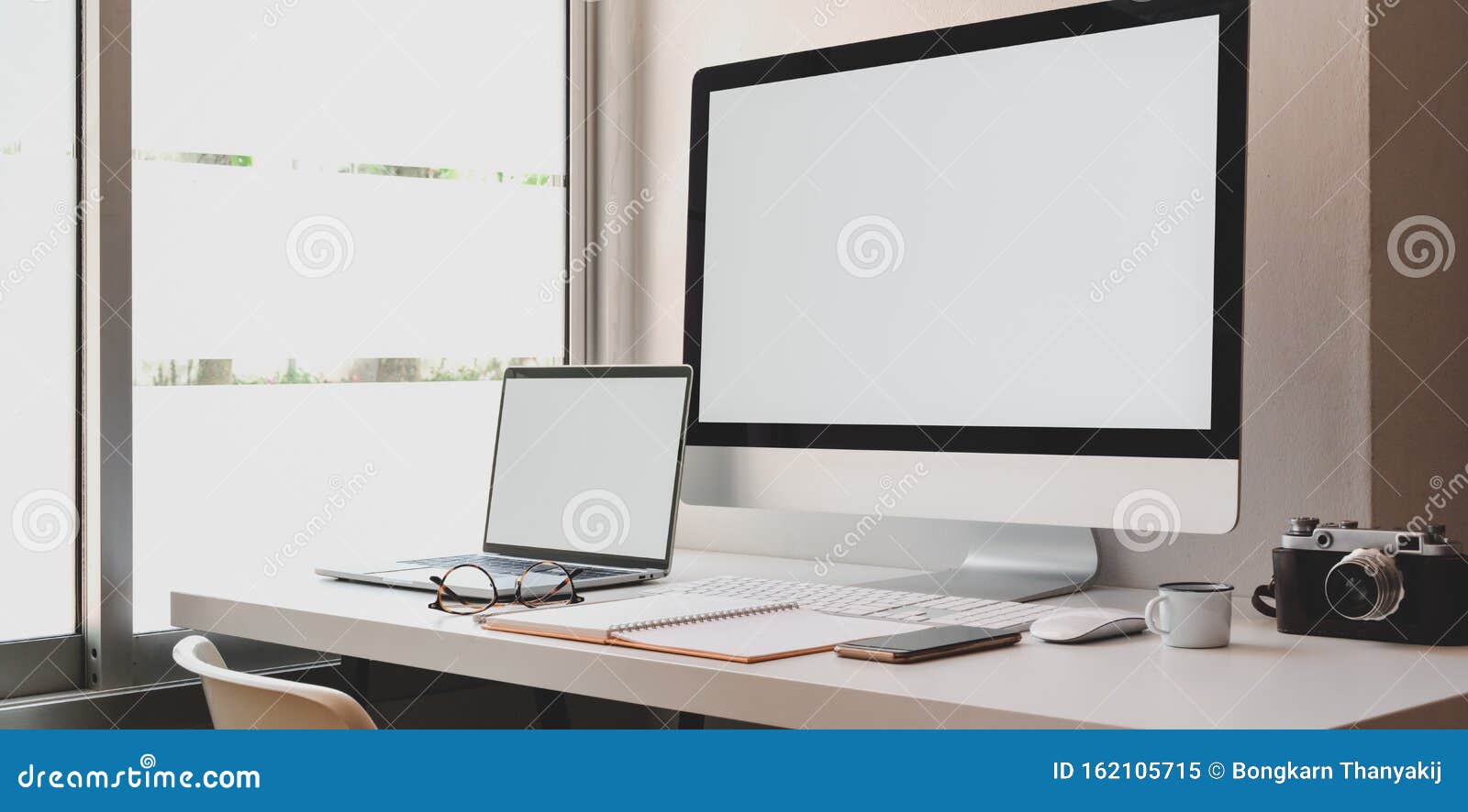 Blank Screen Desktop Computer and Laptop in Modern Workspace Stock ...