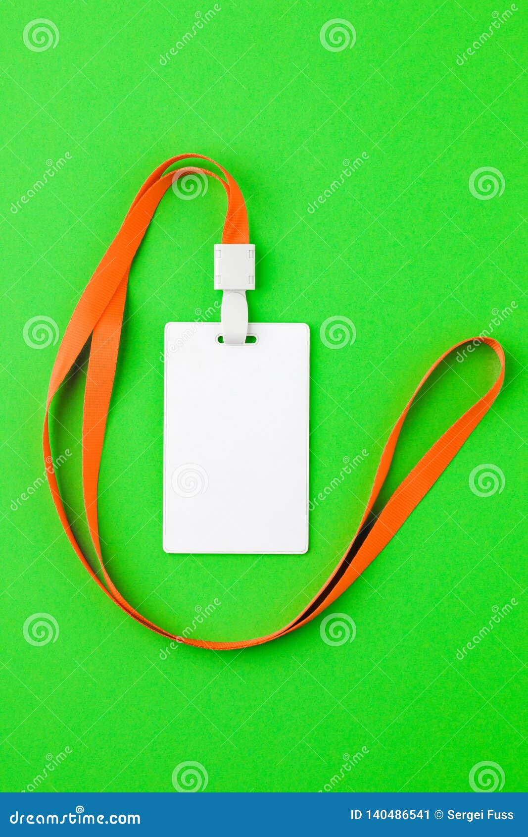 Blank Security Tag with a Red Stripe Neck on a Green Background. Place ...