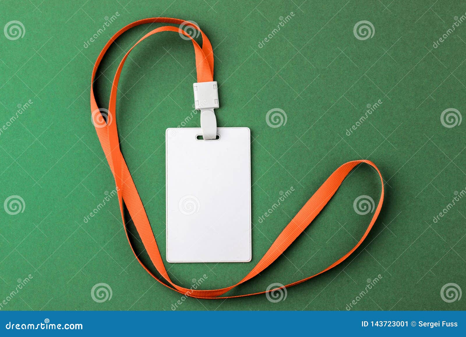 Blank Security Tag with a Red Stripe Neck on a Green Background. Place ...