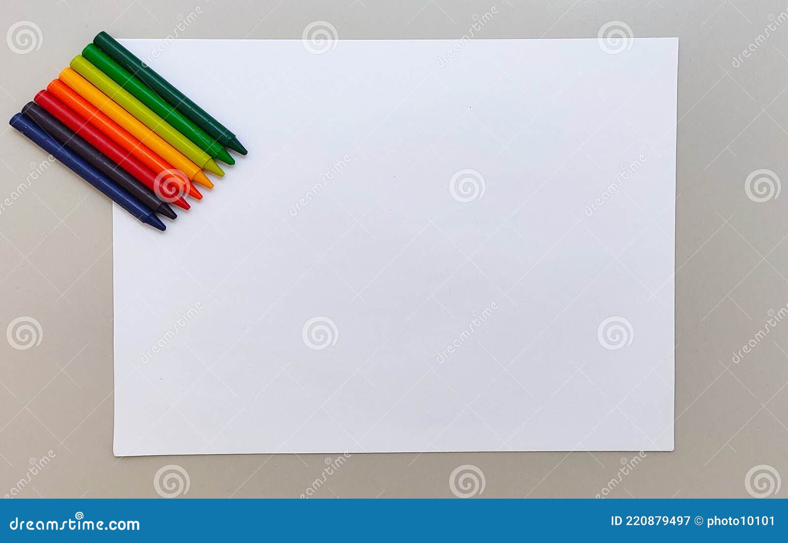 Crayons and sheet of paper stock image. Image of paper - 220879497