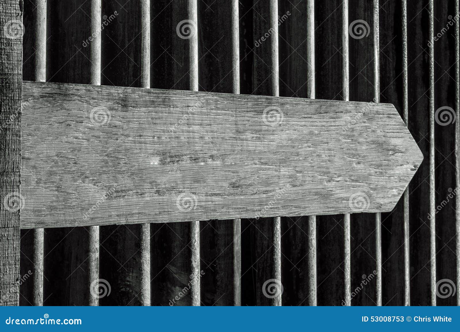 Blank Sign Post Shot Against Corrugated Iron Background In Black And ...