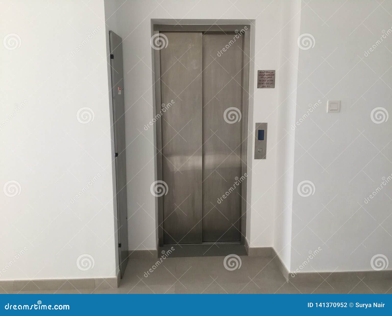 Blank Silver Lift in Home Interior. Side View. Empty Lift with Buttons ...