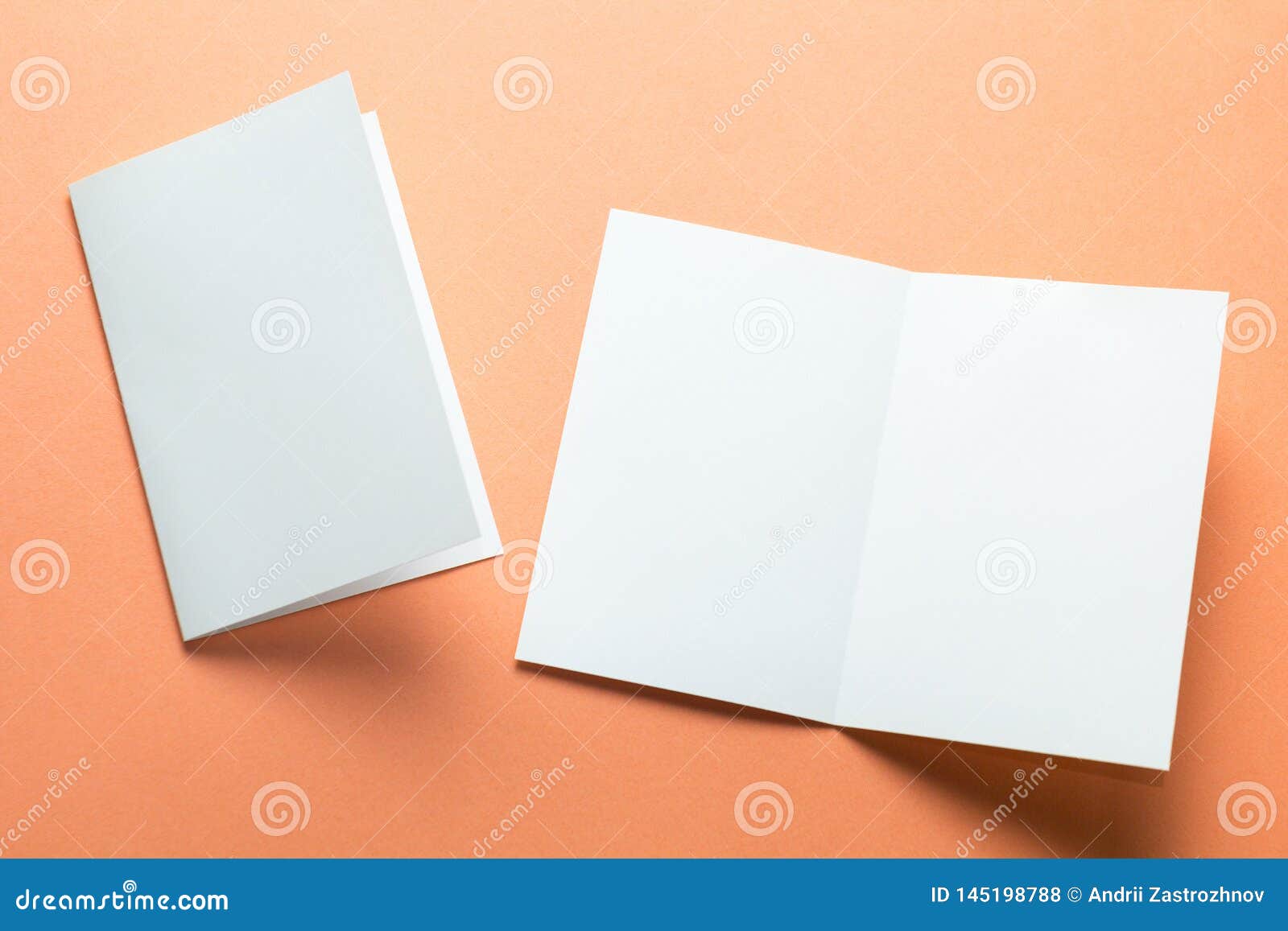 Blank Square Two-leaf Brochures Isolated on Orange Background. Space ...