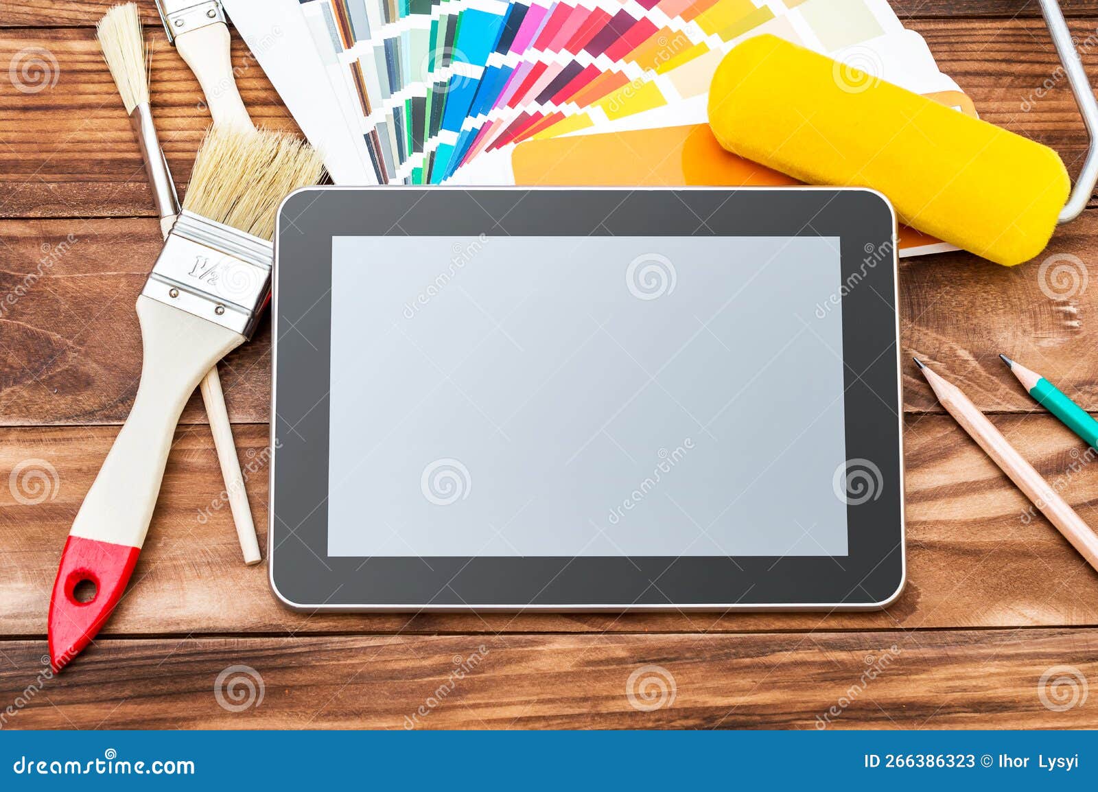 Blank Tablet PC with Color Swatches Book, Paintbrushes and Paint Roller ...