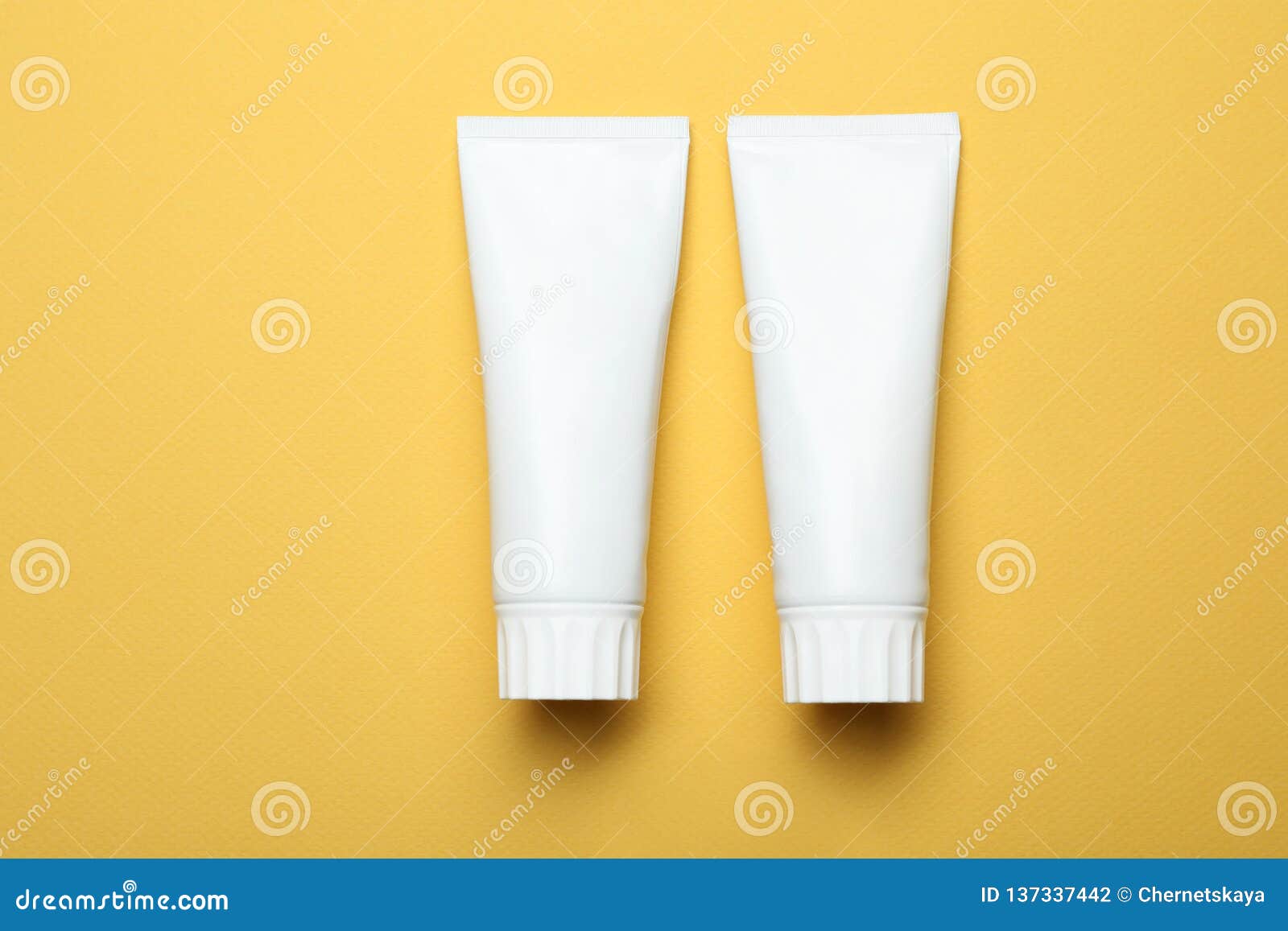 Blank Tubes of Toothpaste on Color Background Stock Photo - Image of ...