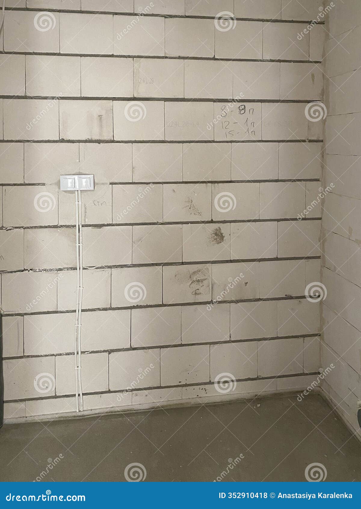 Blank Wall with Two Electrical Outlets, Empty Flat with Concrete Screed ...