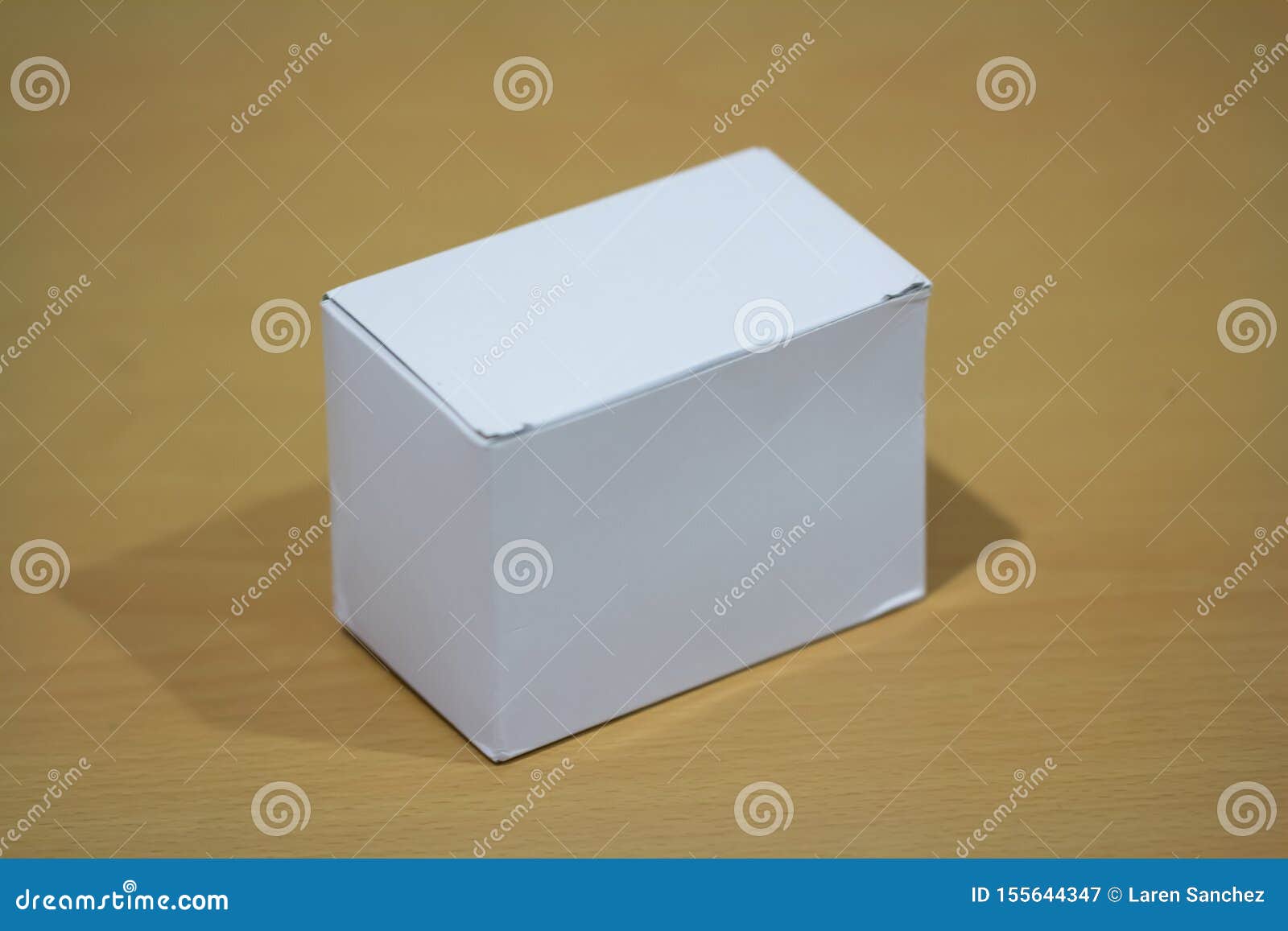 Blank white box on a table stock image. Image of table - 155644347