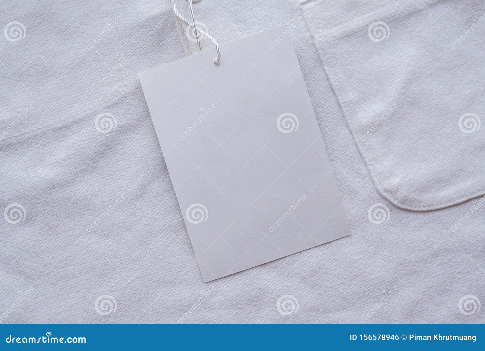 Blank White Clothes Tag Label on New Shirt Stock Photo - Image of ...