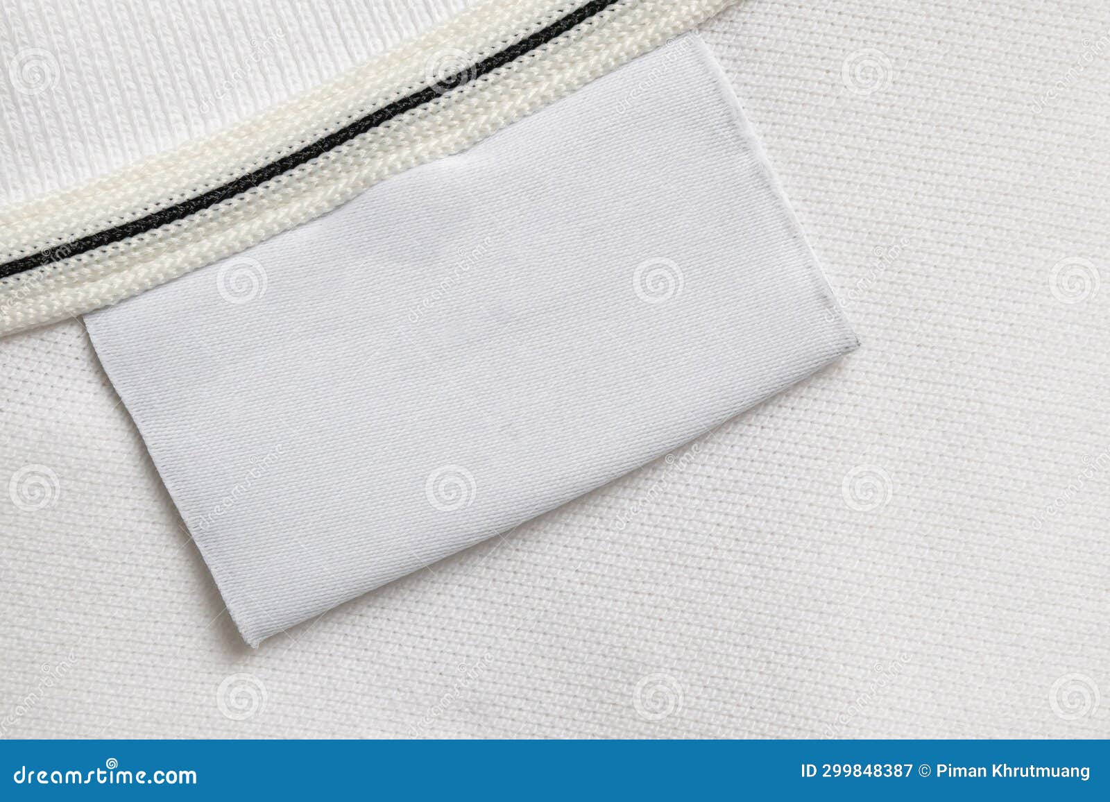 Blank Laundry Care Clothes Label on White Shirt Fabric Texture ...