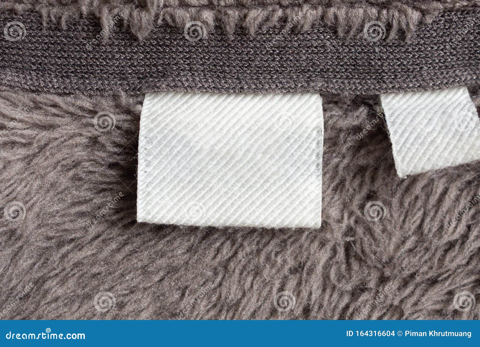 Blank White Laundry Care Clothing Label on Fur Texture Background Stock ...