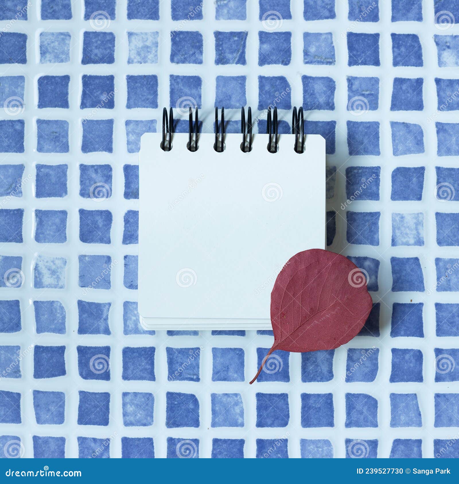 Blank White Notepad on Blue Ceramic Mosaic Table Stock Photo - Image of ...