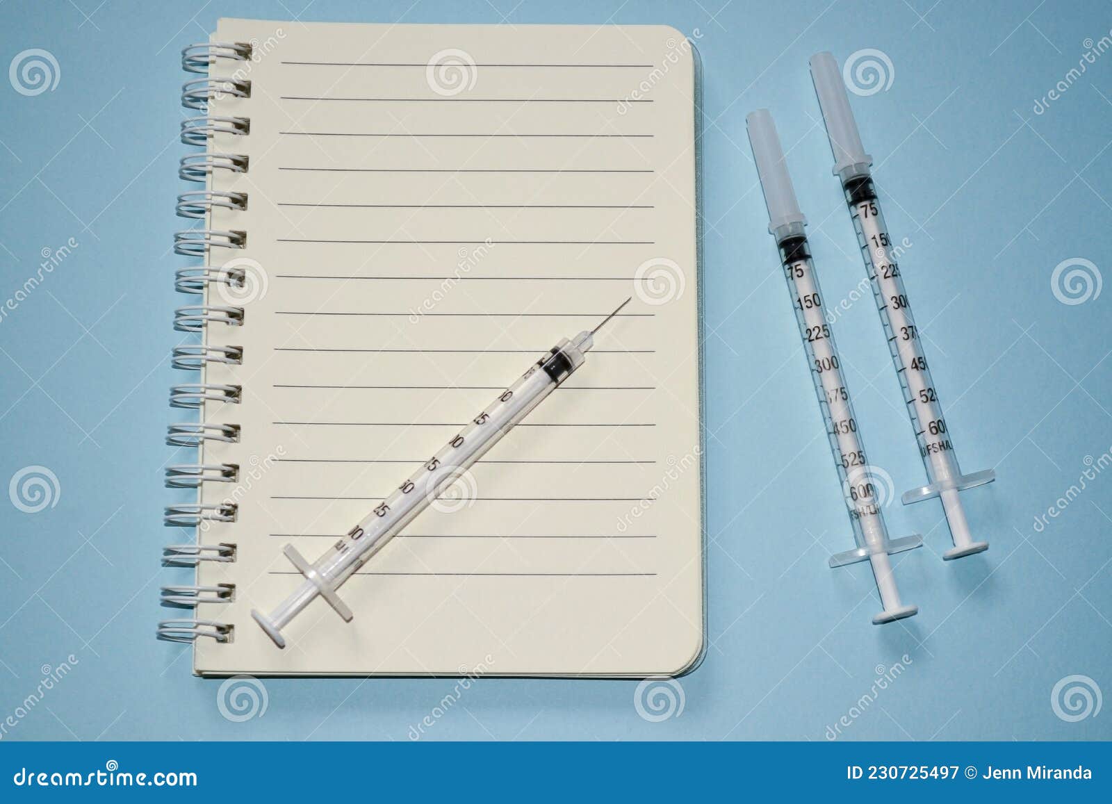 Blank White Notepad with Disposable Injection Syringes Stock Image ...