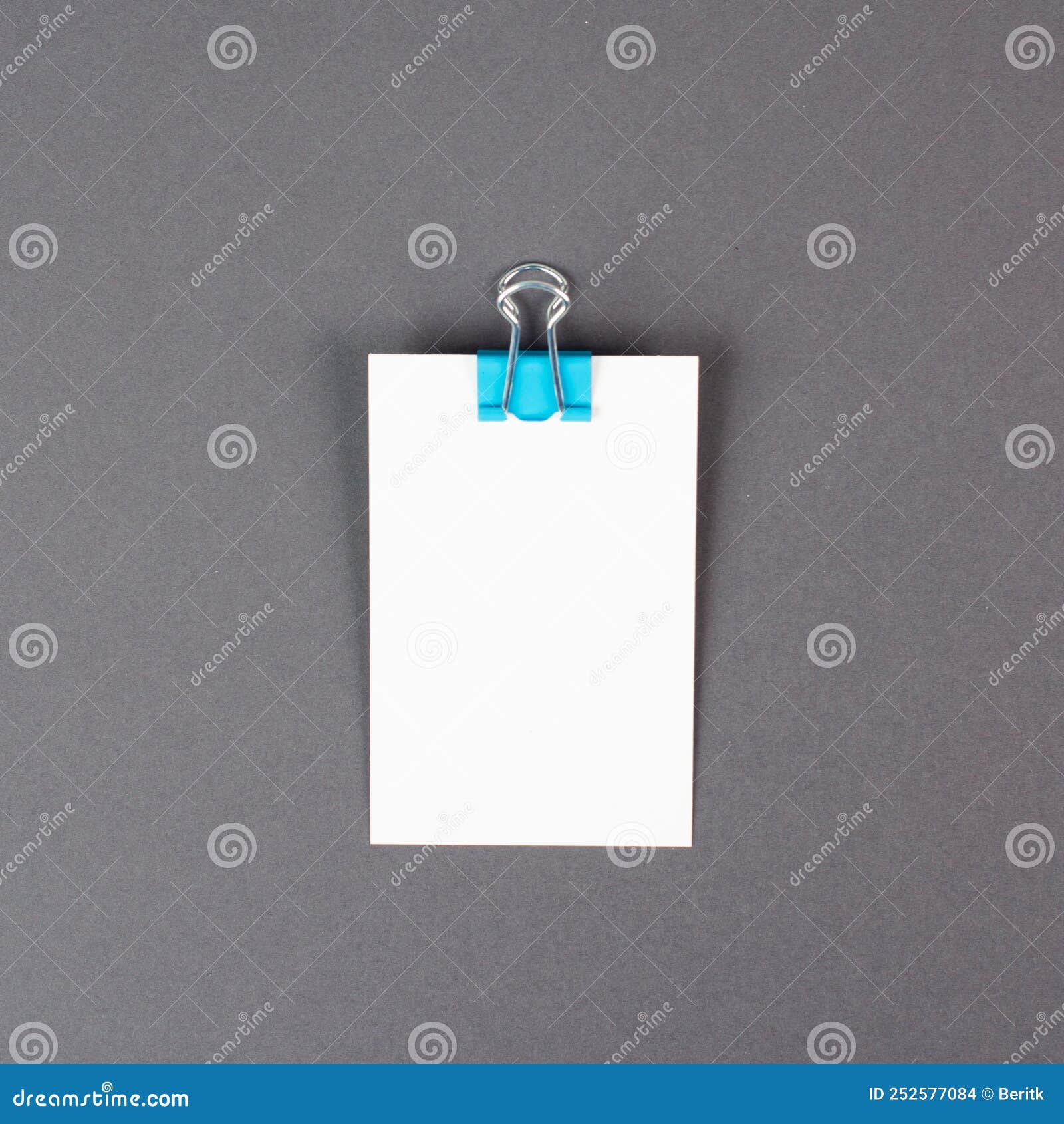 Blank White Paper with a Paperclip on a Gray Colored Background, Copy ...