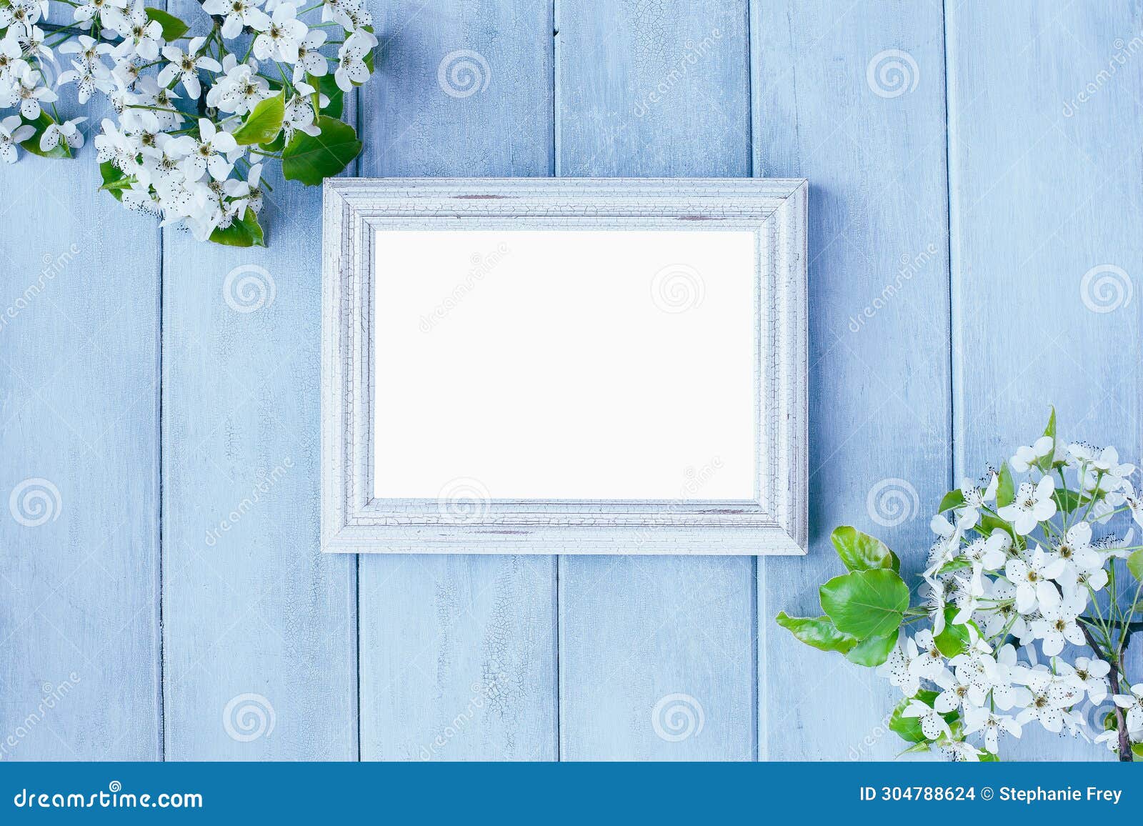 Blank White Picture Frame Over Light Blue Spring Background Stock Photo ...
