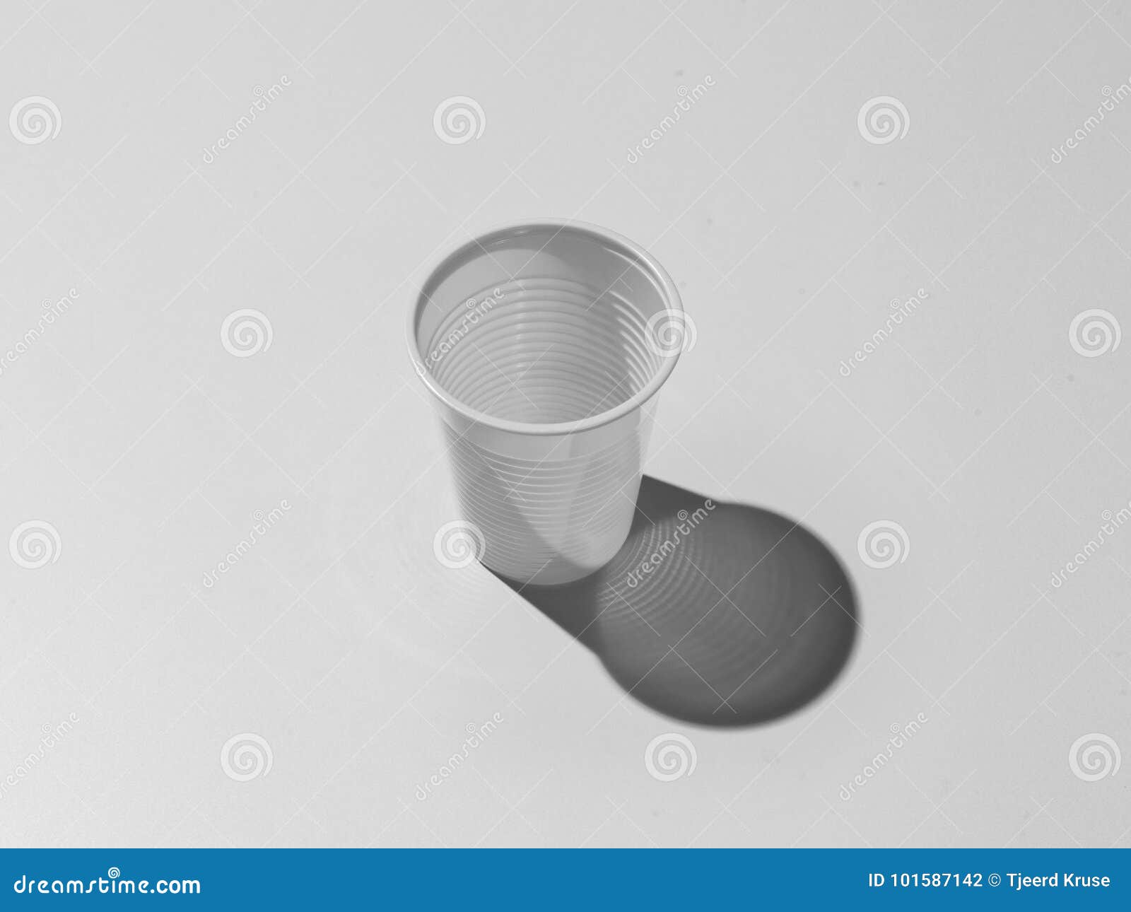 White Plastic Cup on the Grey Background Stock Photo - Image of people ...
