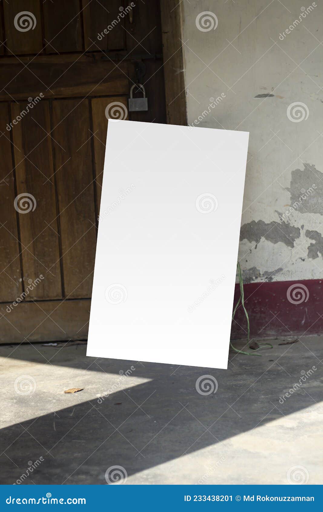 A Blank White Sign Board Leaning Against a Wall, Real Shadow, and the ...