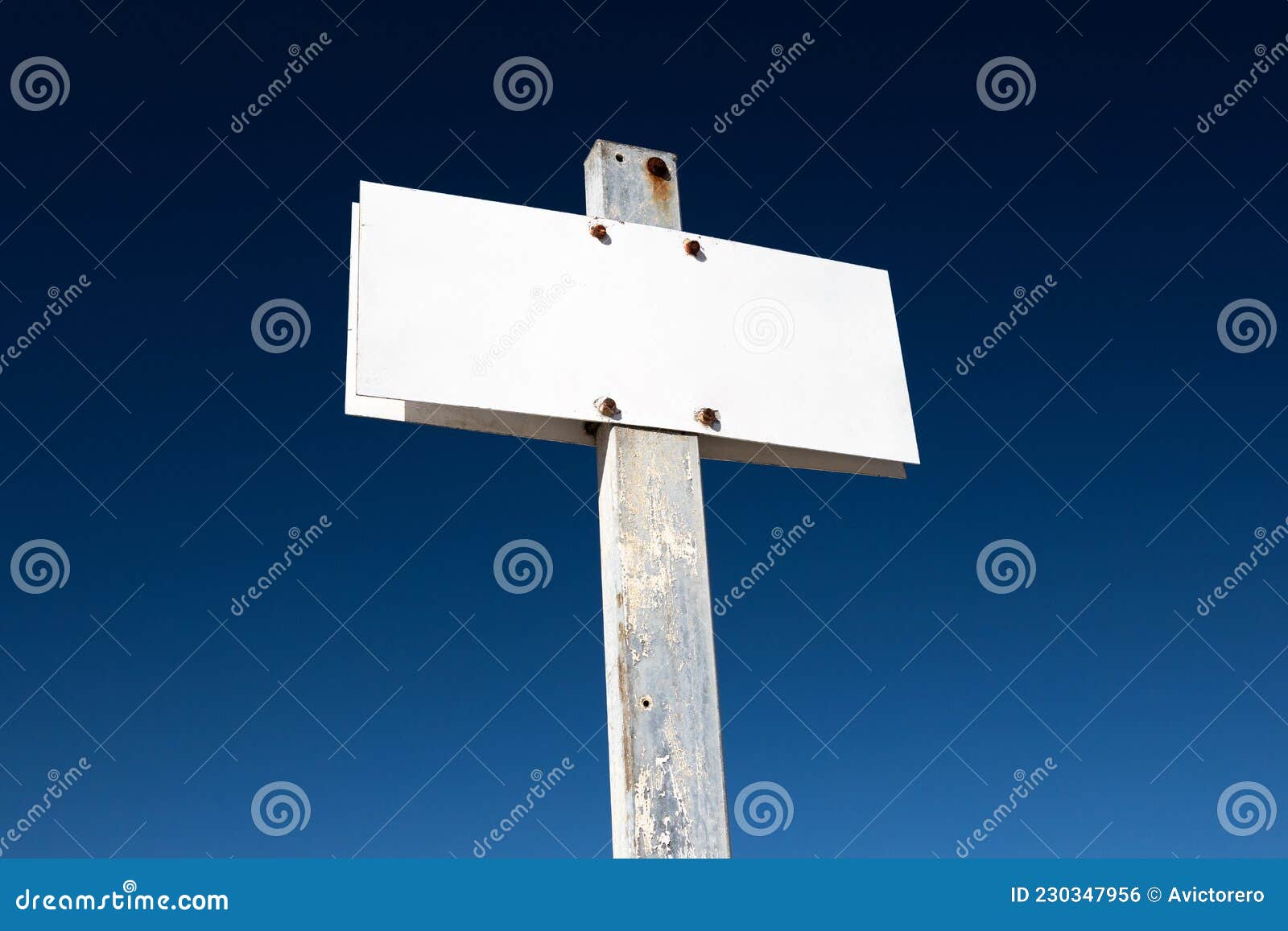 Blank White Sign Isolated on Dramatic Blue Sky Stock Photo - Image of ...