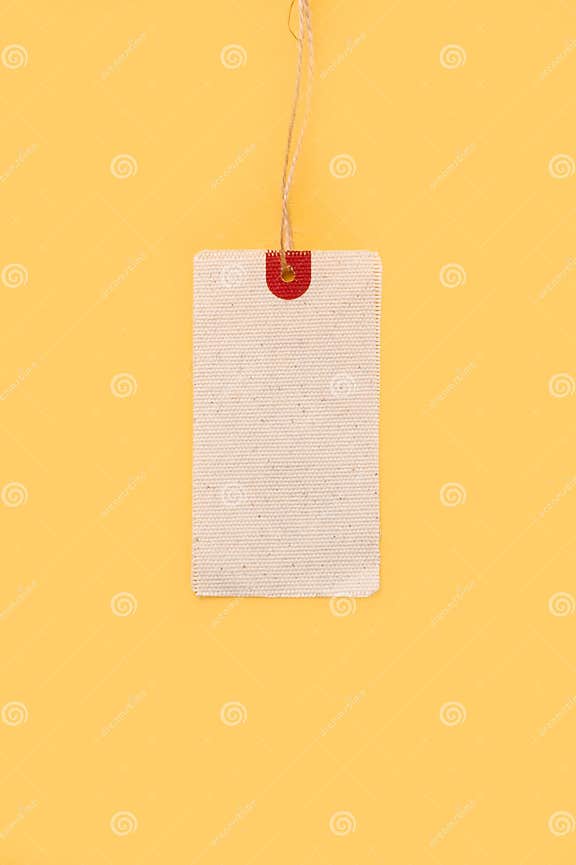 Blank White Textile Label on a Yellow Background with Copy Space Stock ...