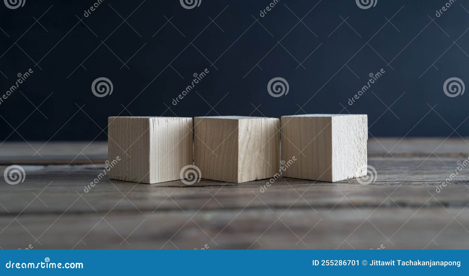 Blank Wooden Cube Blocks on the Table. Three Pieces are Placed Side by ...