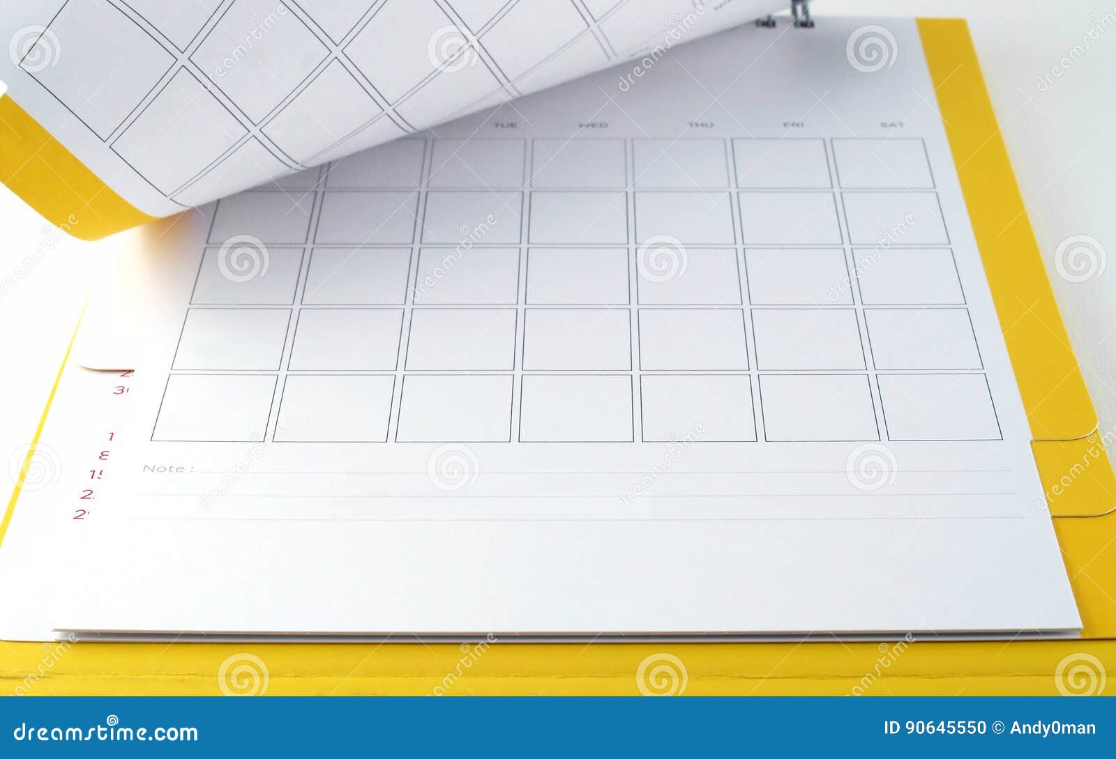 Open Blank Yellow Desk Calendar With Grid And Empty Lines For Write ...