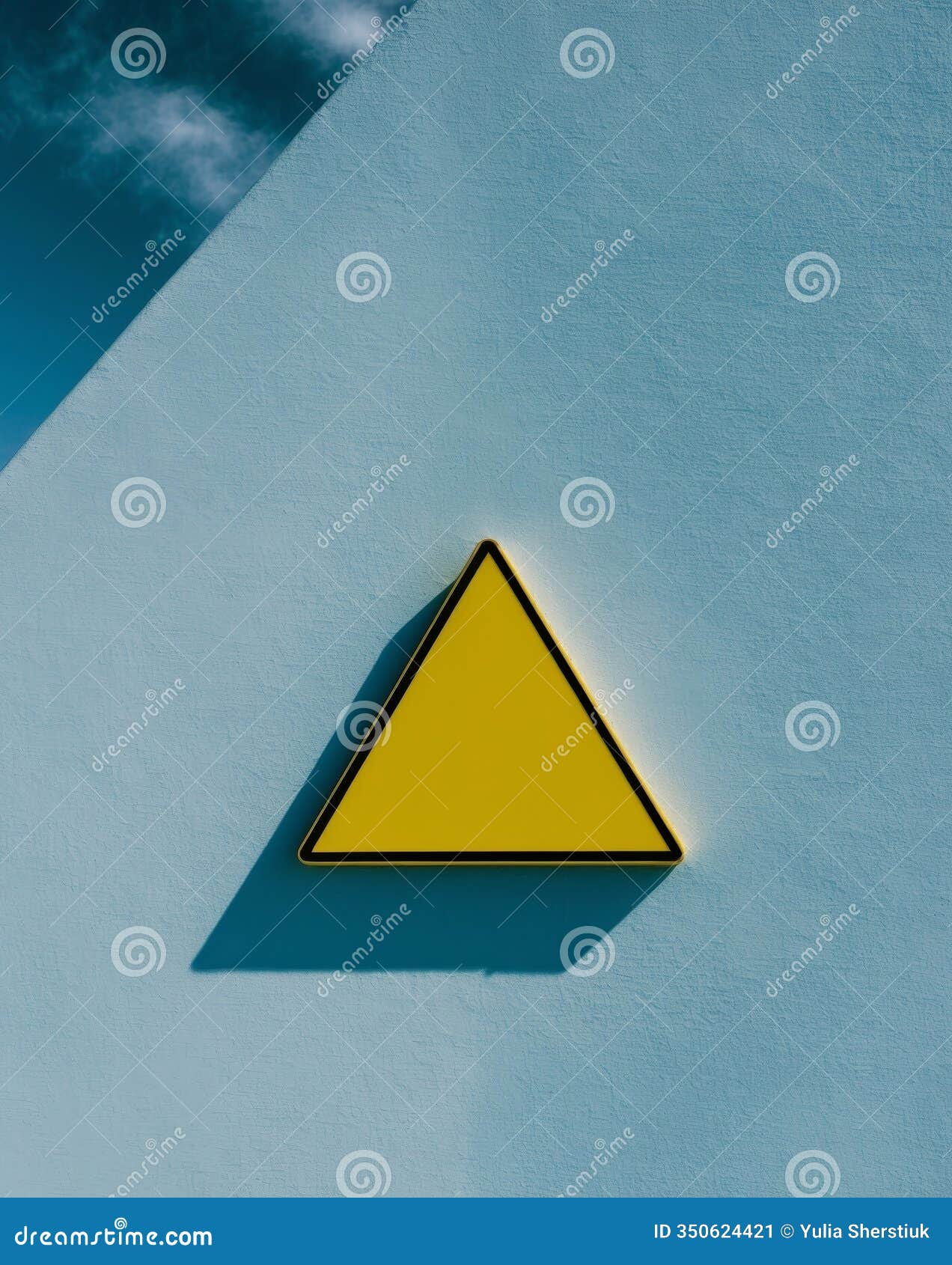 Blank Yellow Triangle Warning Sign on Blue Wall Stock Image - Image of ...