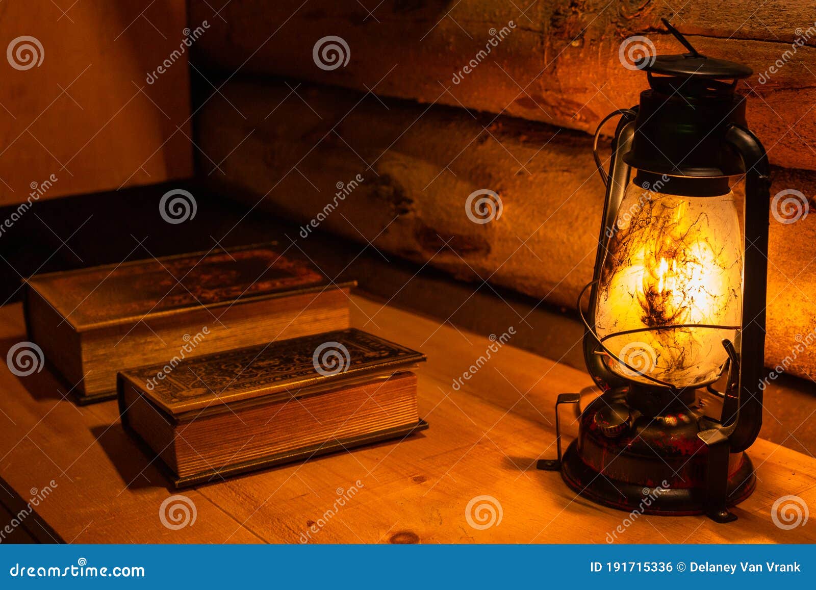 Reading by Lantern Light in a Log Cabin Stock Photo - Image of fire ...