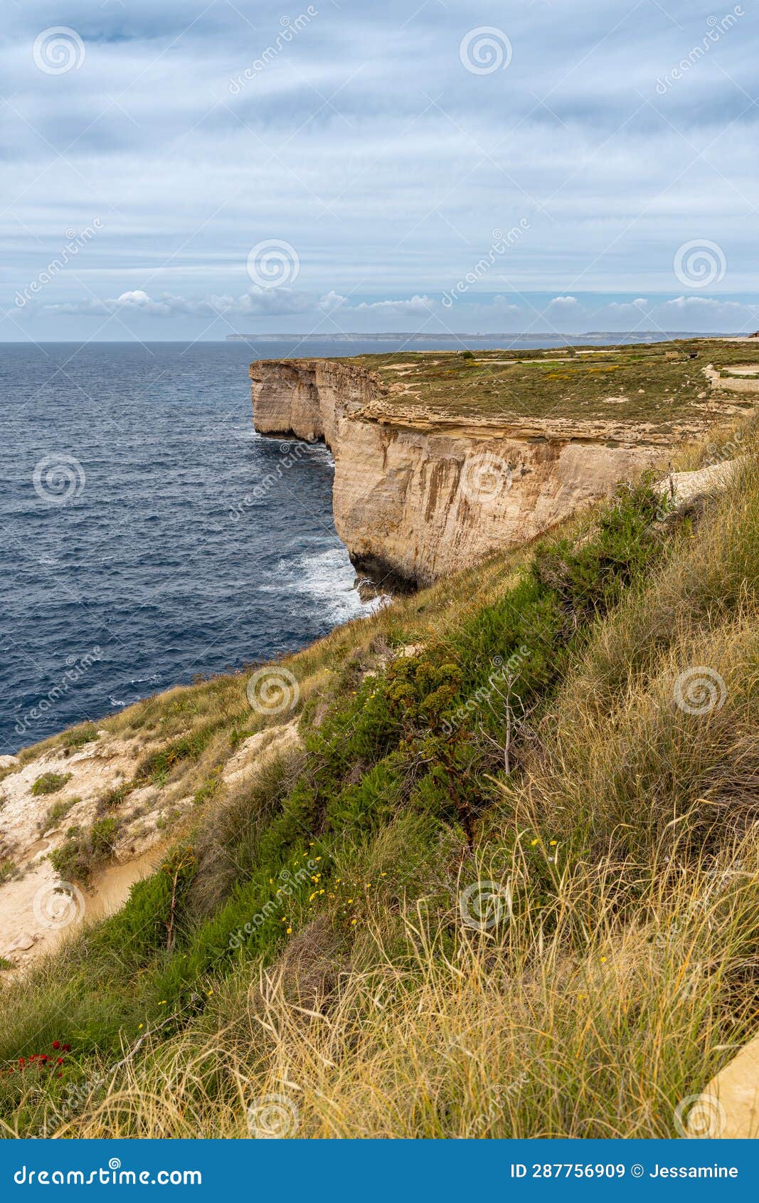 Coastline With Cliff Mountain And Seashore View. Pitched Rock Face On ...