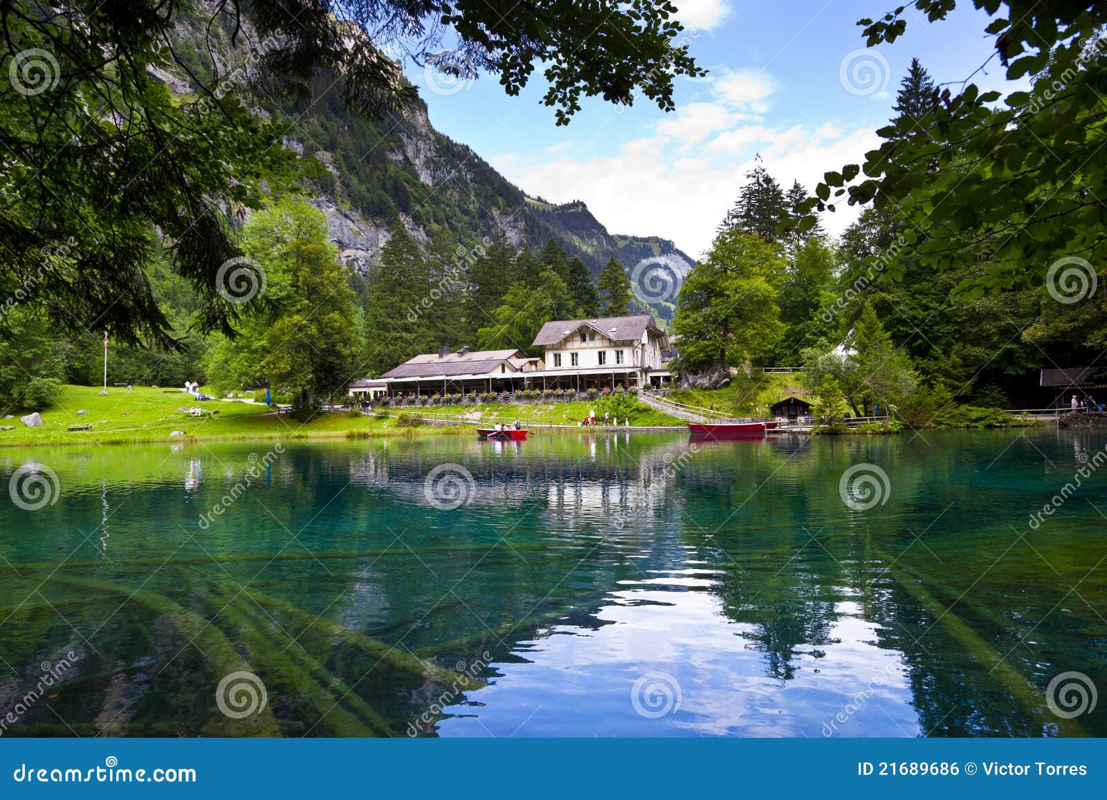 Blausee Lake stock photo. Image of blue, jetty, cottage - 21689686