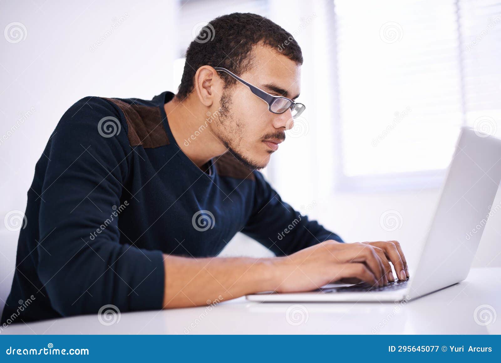Blazing through Lines of Code with Ease. a Handsome Young Man Working ...